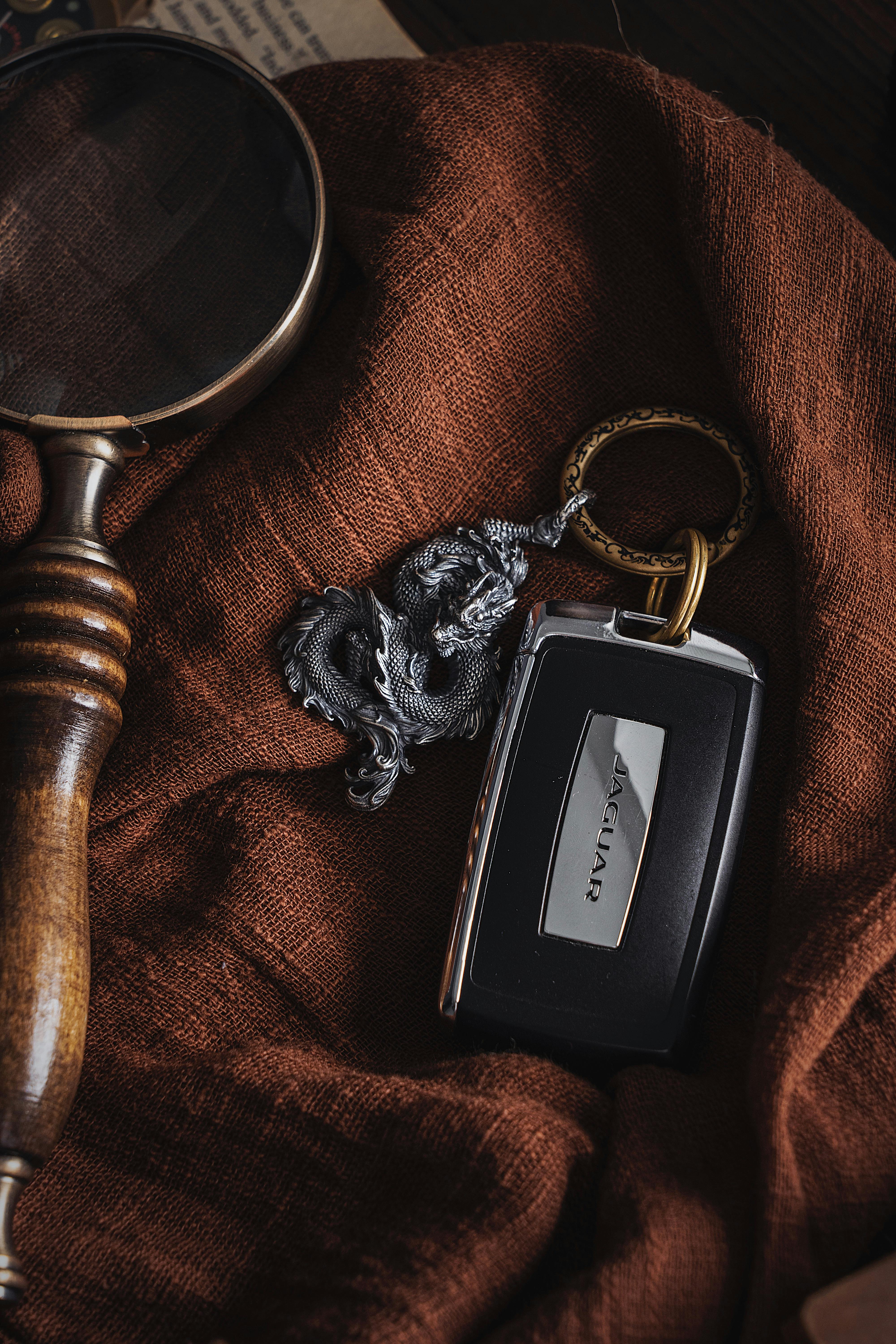 Car Key and a Magnifying Glass · Free Stock Photo