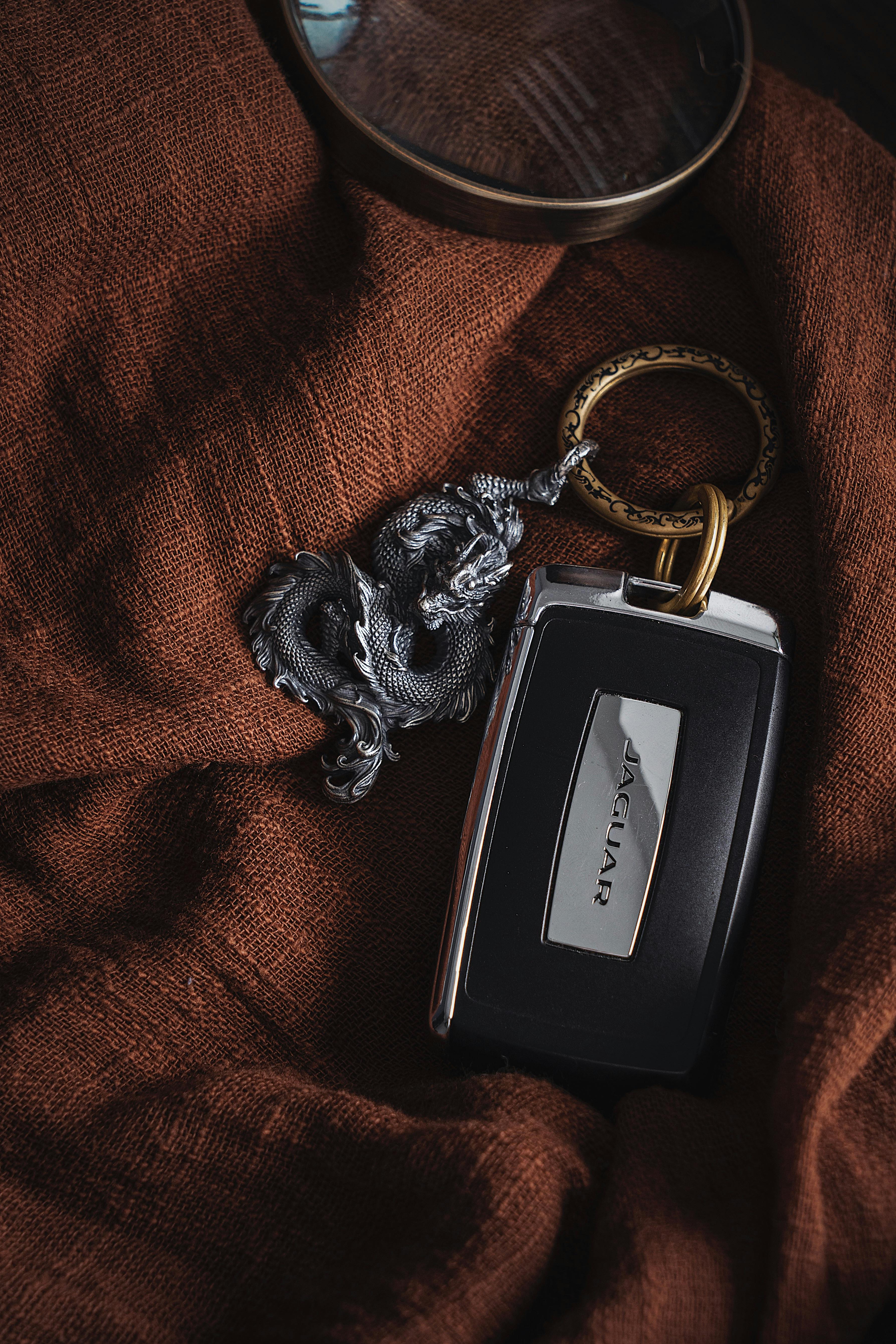 Car Key with a Chinese Dragon Charm · Free Stock Photo