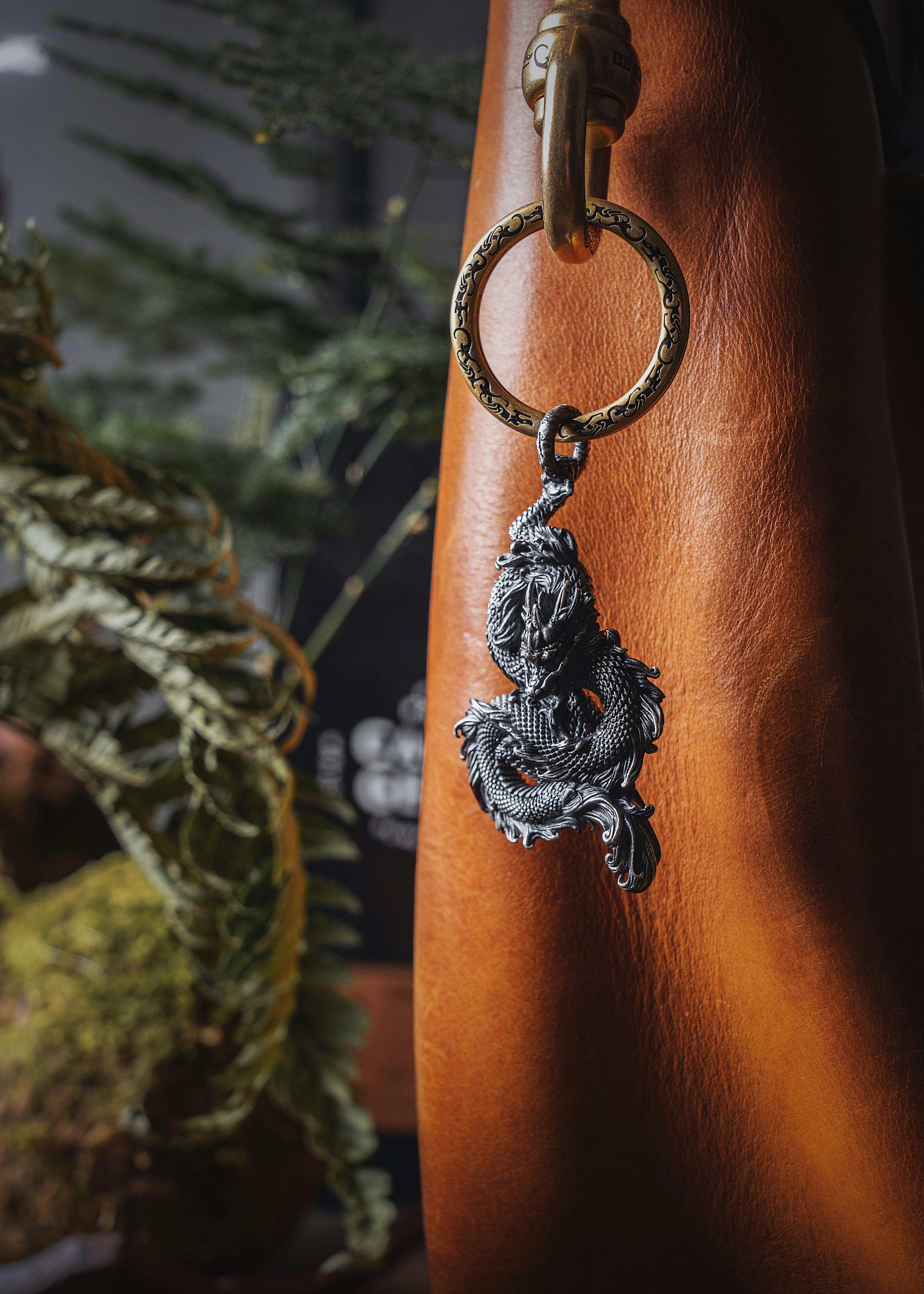 Chinese Dragon Keychain Hanging on a Ring · Free Stock Photo