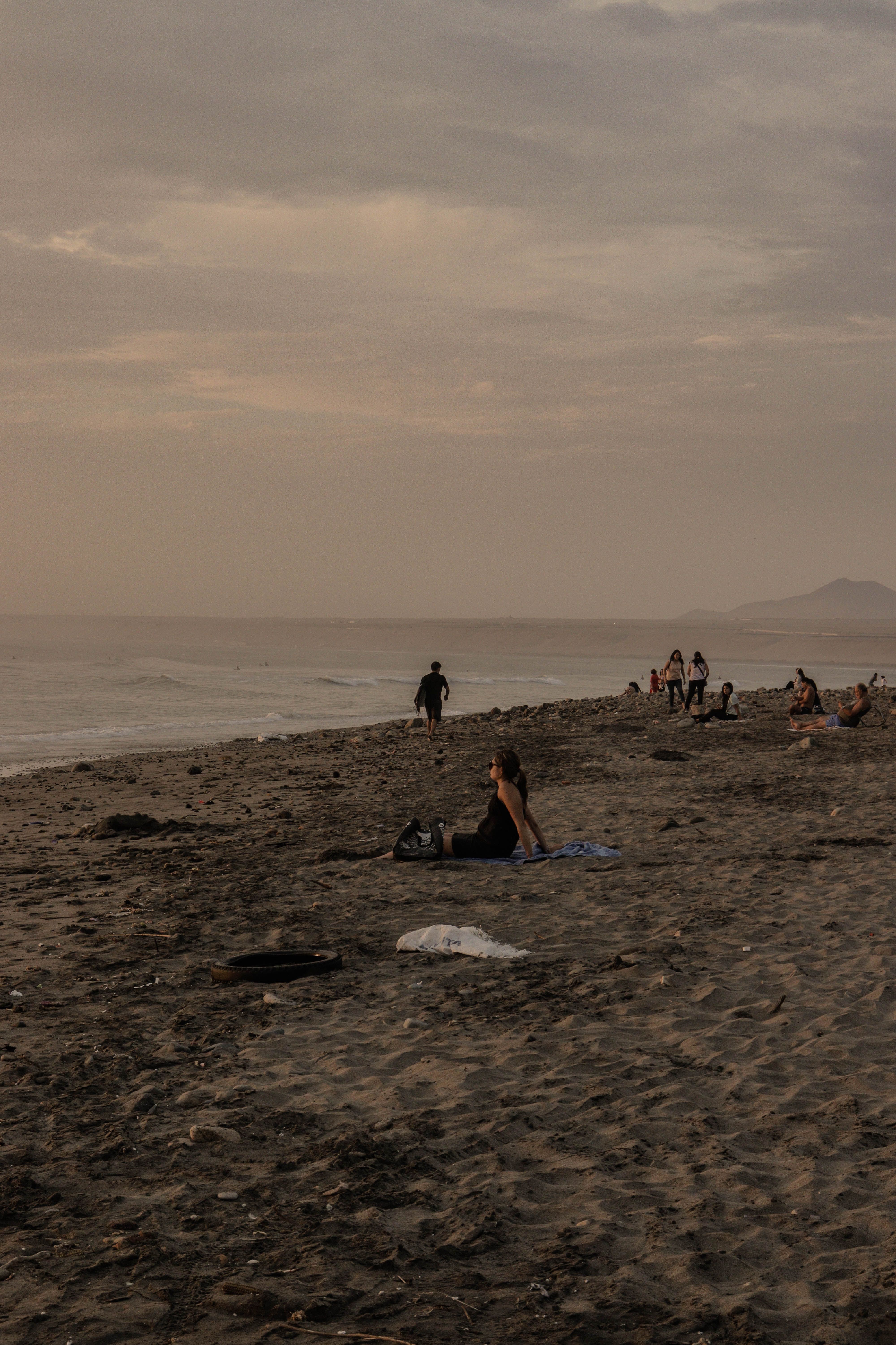 People on Beach near Sea · Free Stock Photo