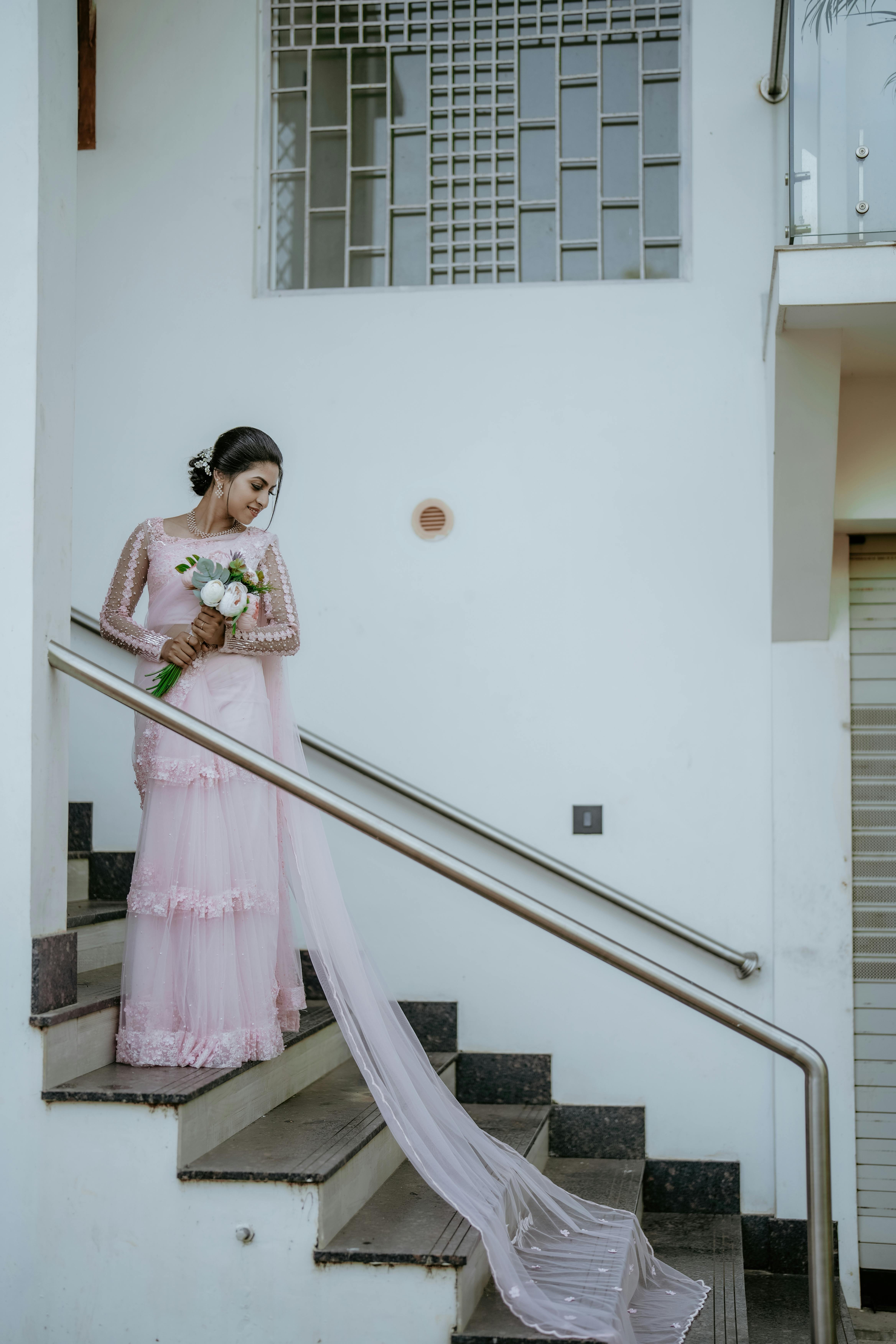 Woman in Dress on Stairs · Free Stock Photo