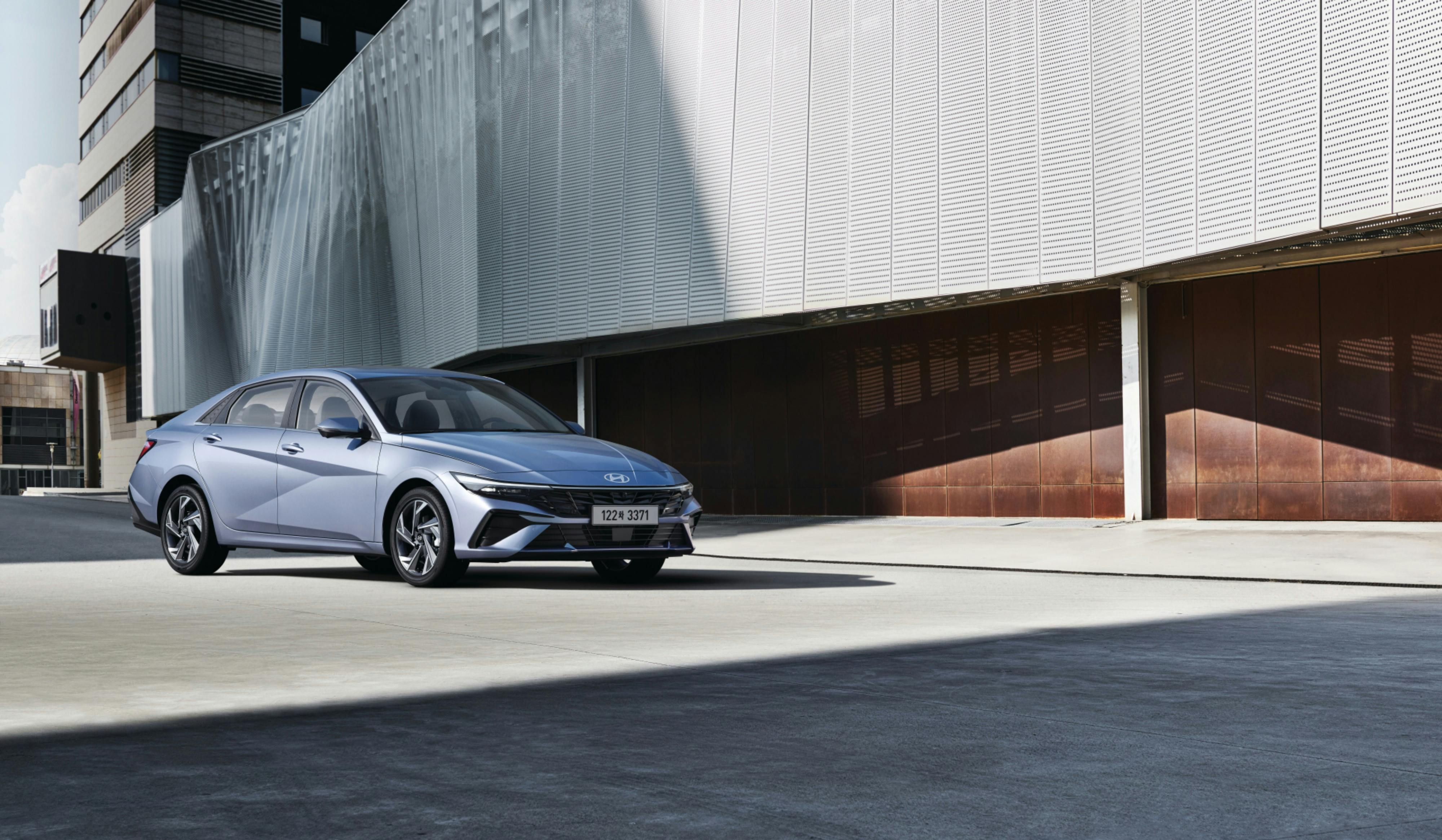 Car in front of Modern Building · Free Stock Photo