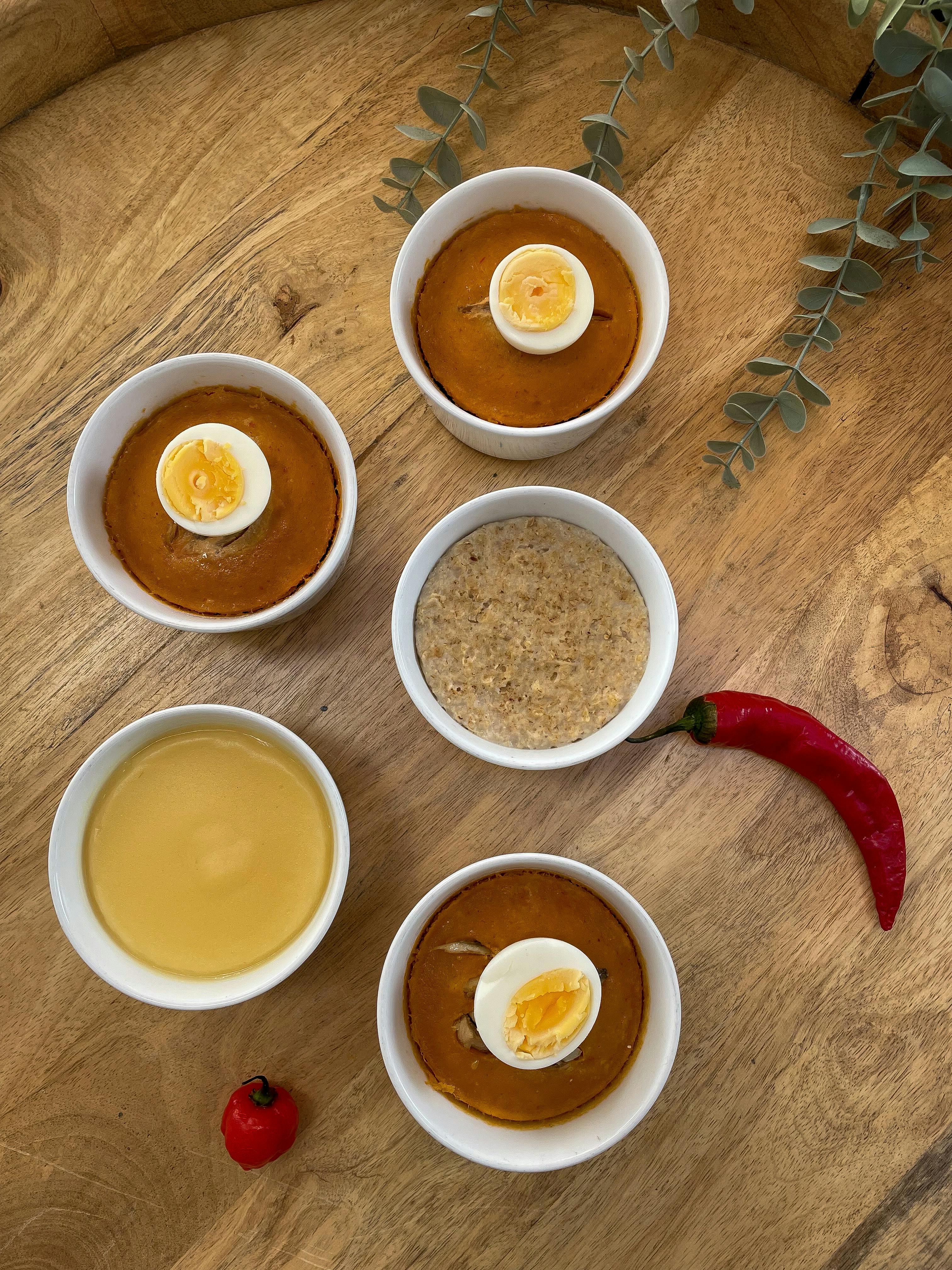 An Animation of Spilled Soup on a Yellow Background · Free Stock Photo