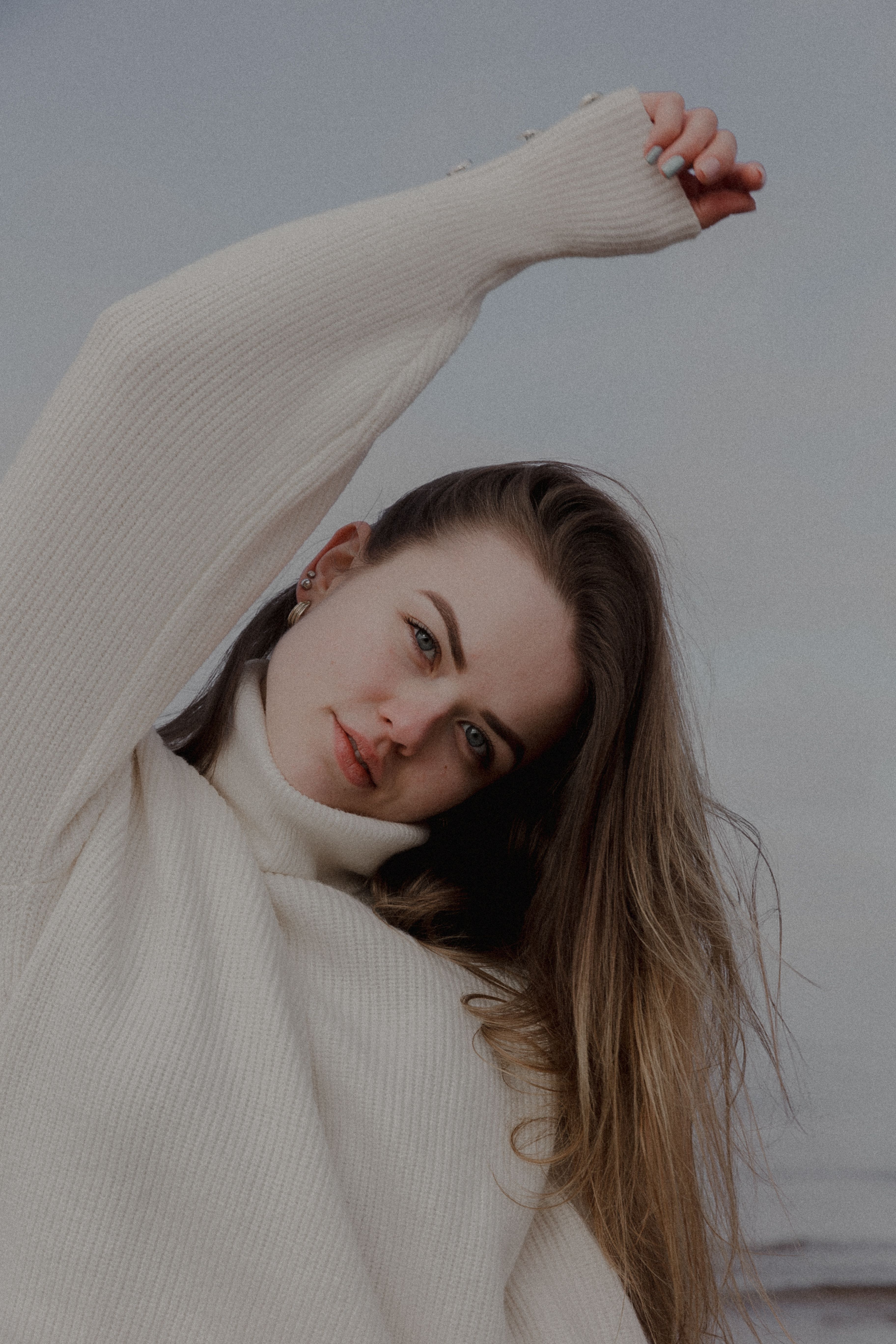Woman Posing in Sweater · Free Stock Photo