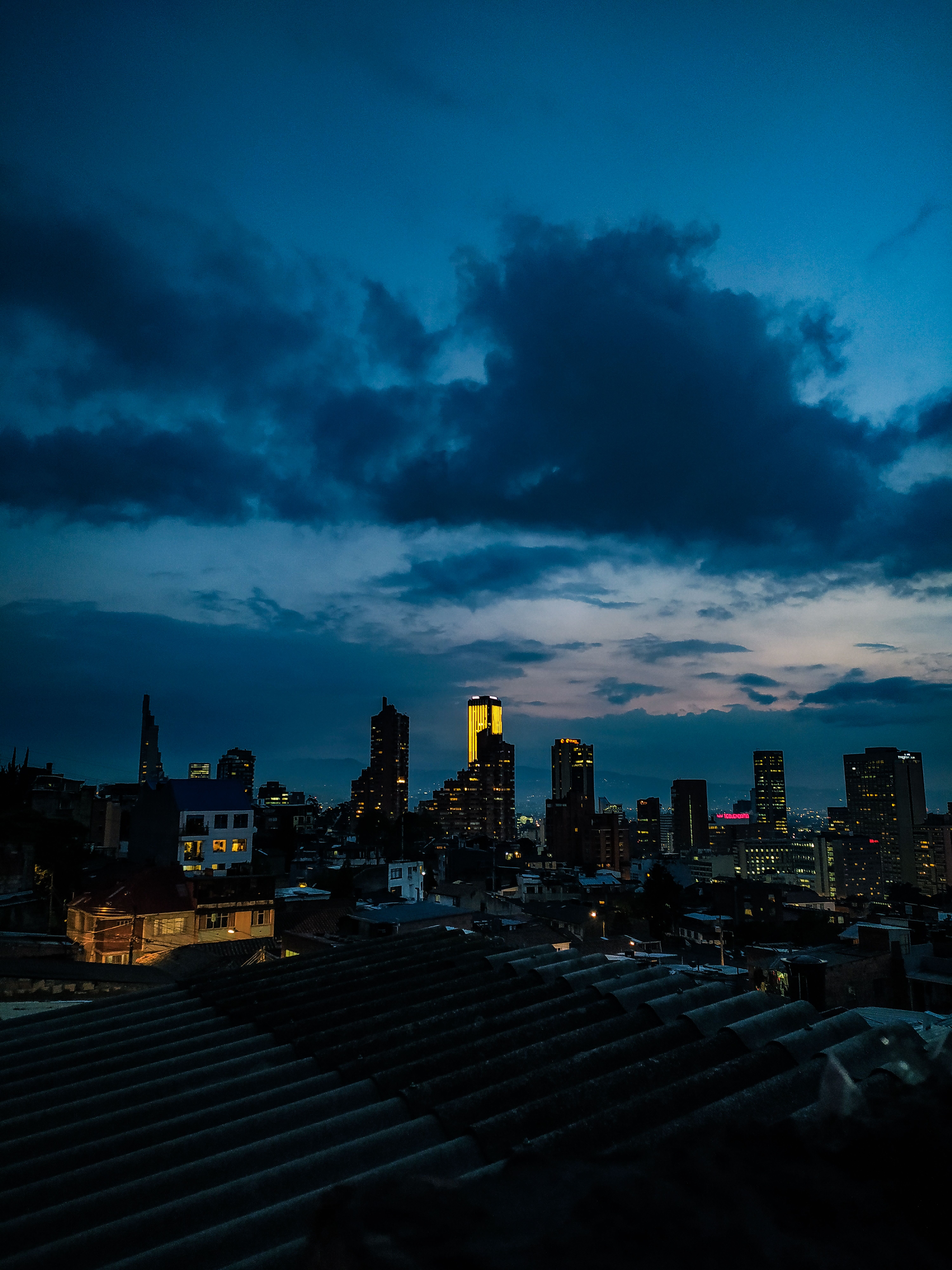 Skyscrapers under Night Sky seen from Roof of Build · Free Stock Photo