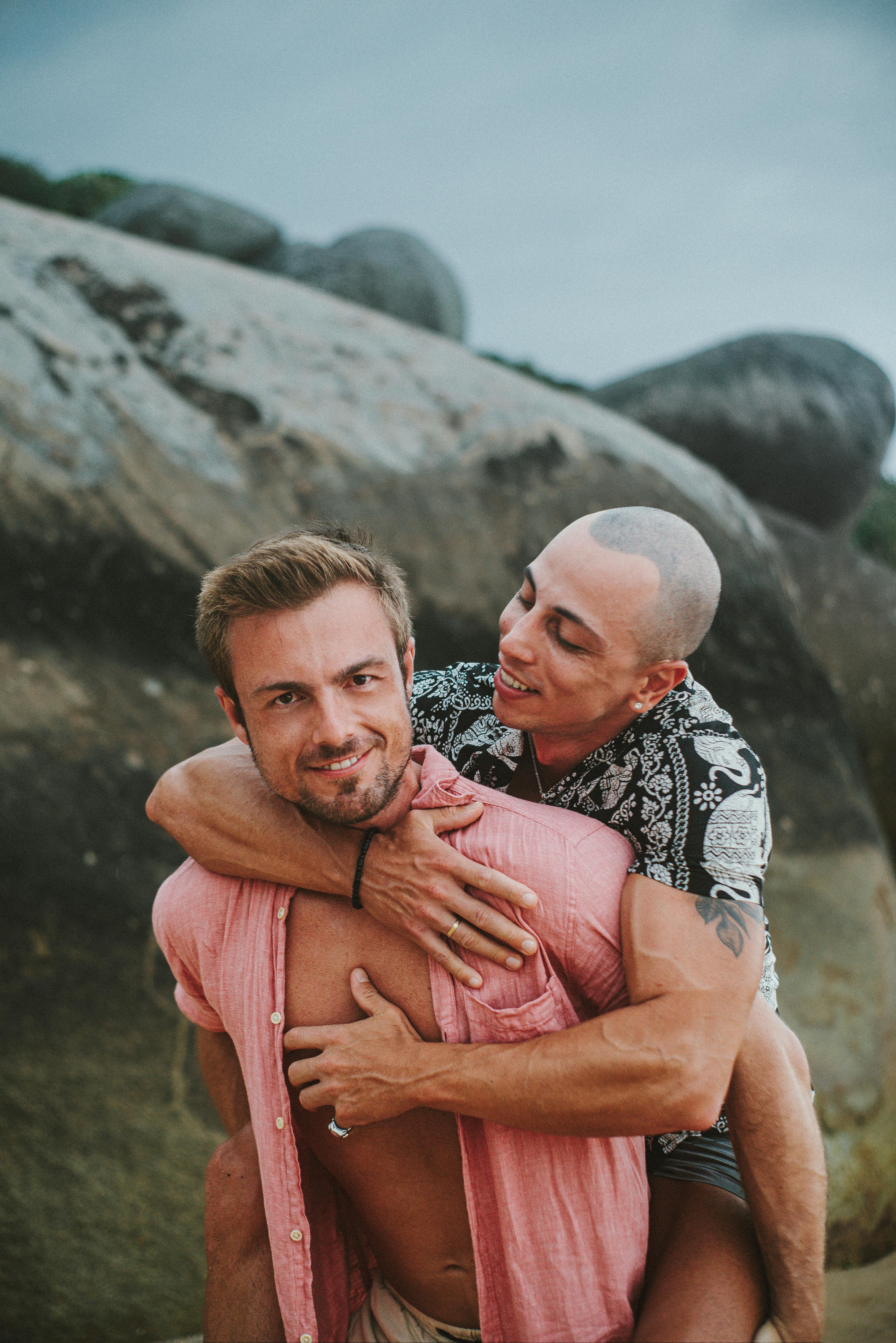 Man Carrying another Man Piggyback · Free Stock Photo