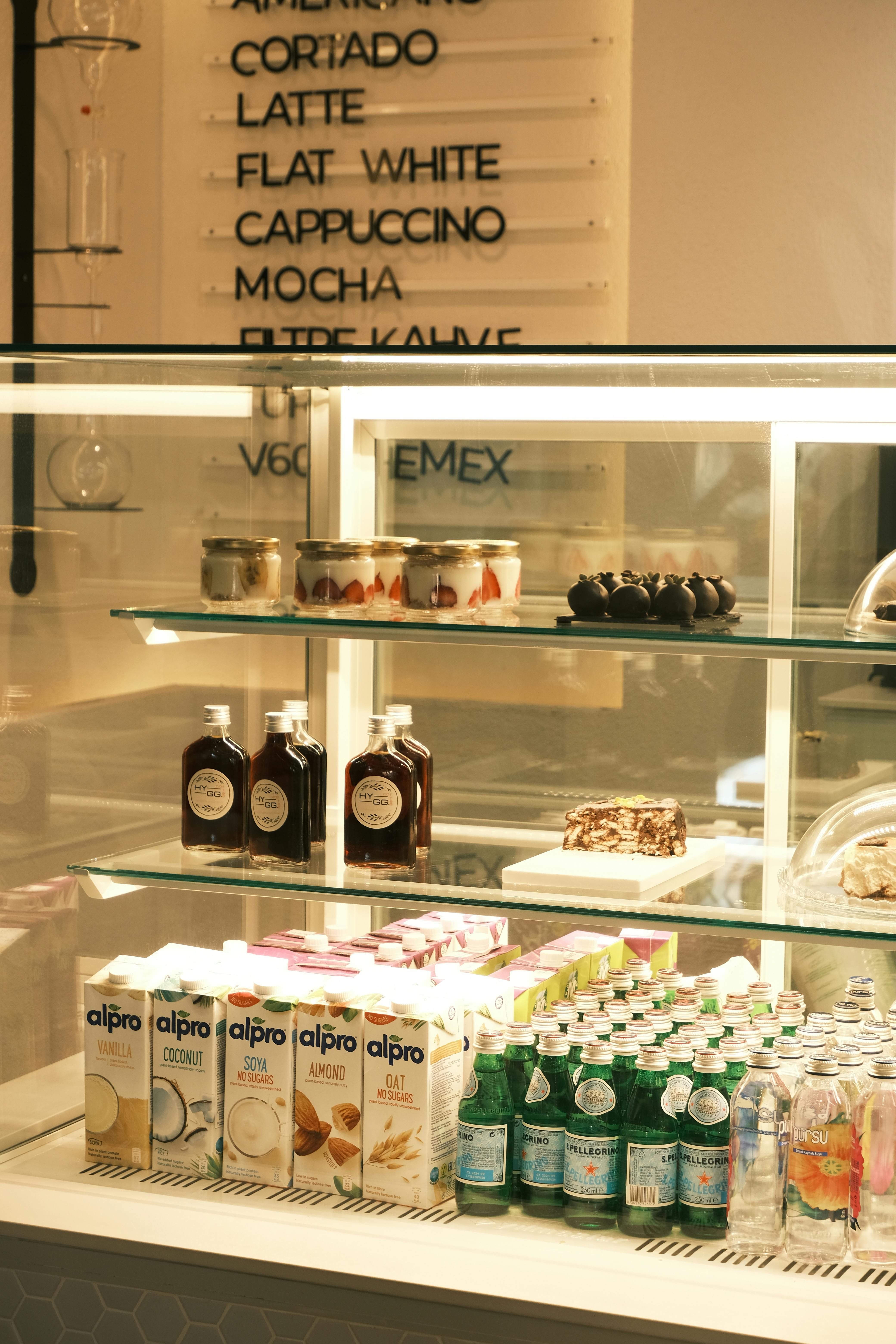 Display Cabinet with Drinks and Snacks in a Cafe · Free Stock Photo