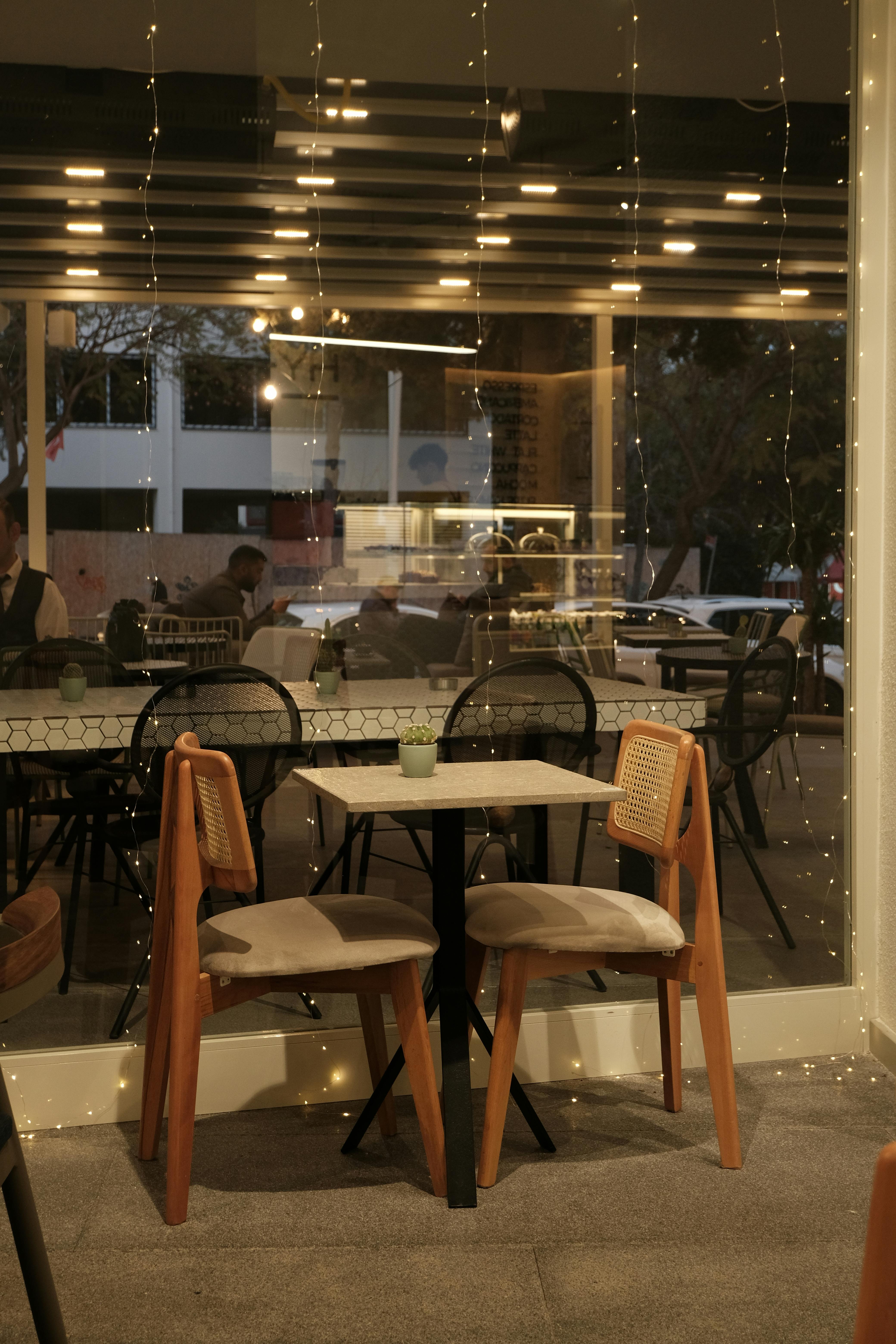 Cafe Tables and Chairs · Free Stock Photo