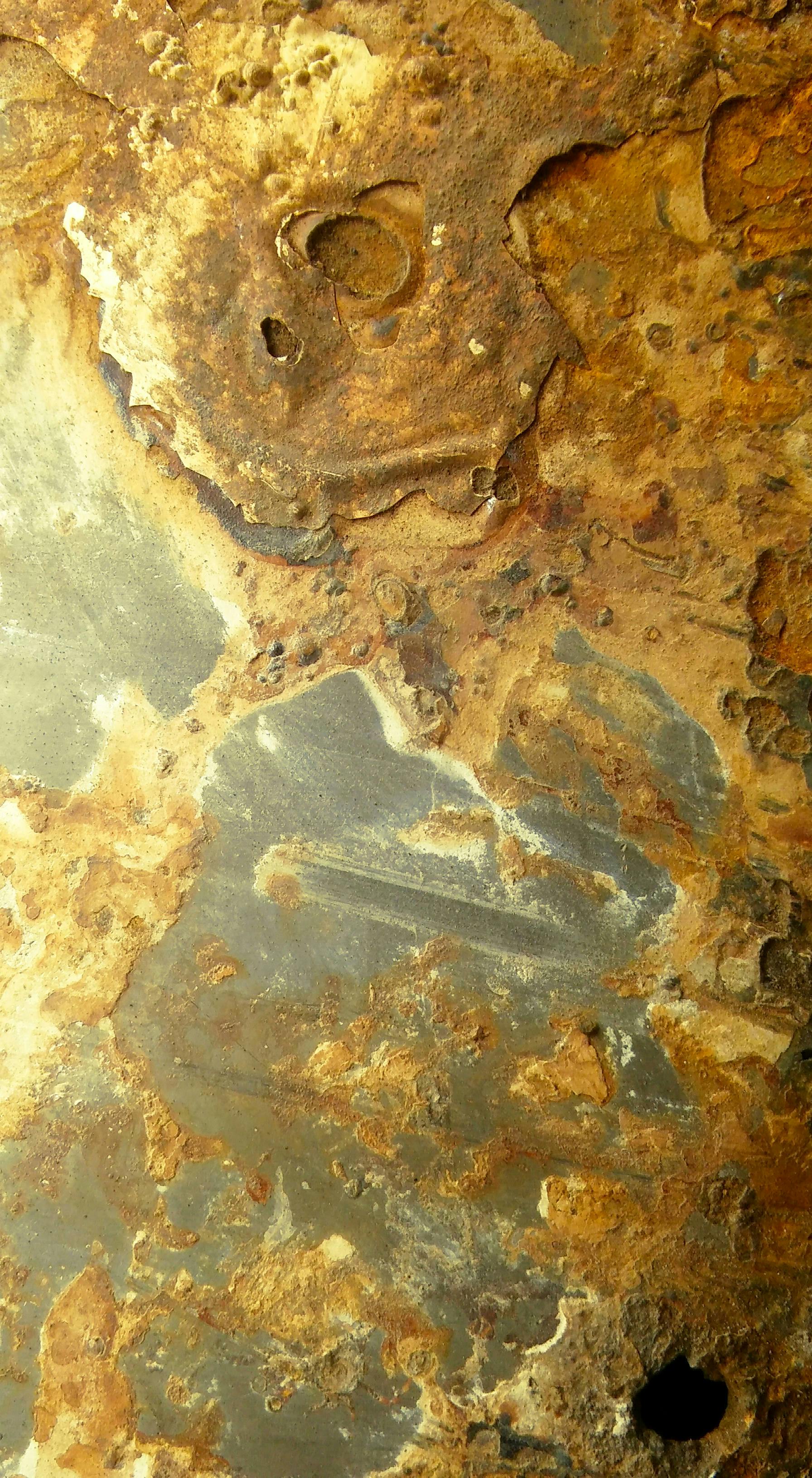 Brown Stain On A Rough Surface · Free Stock Photo