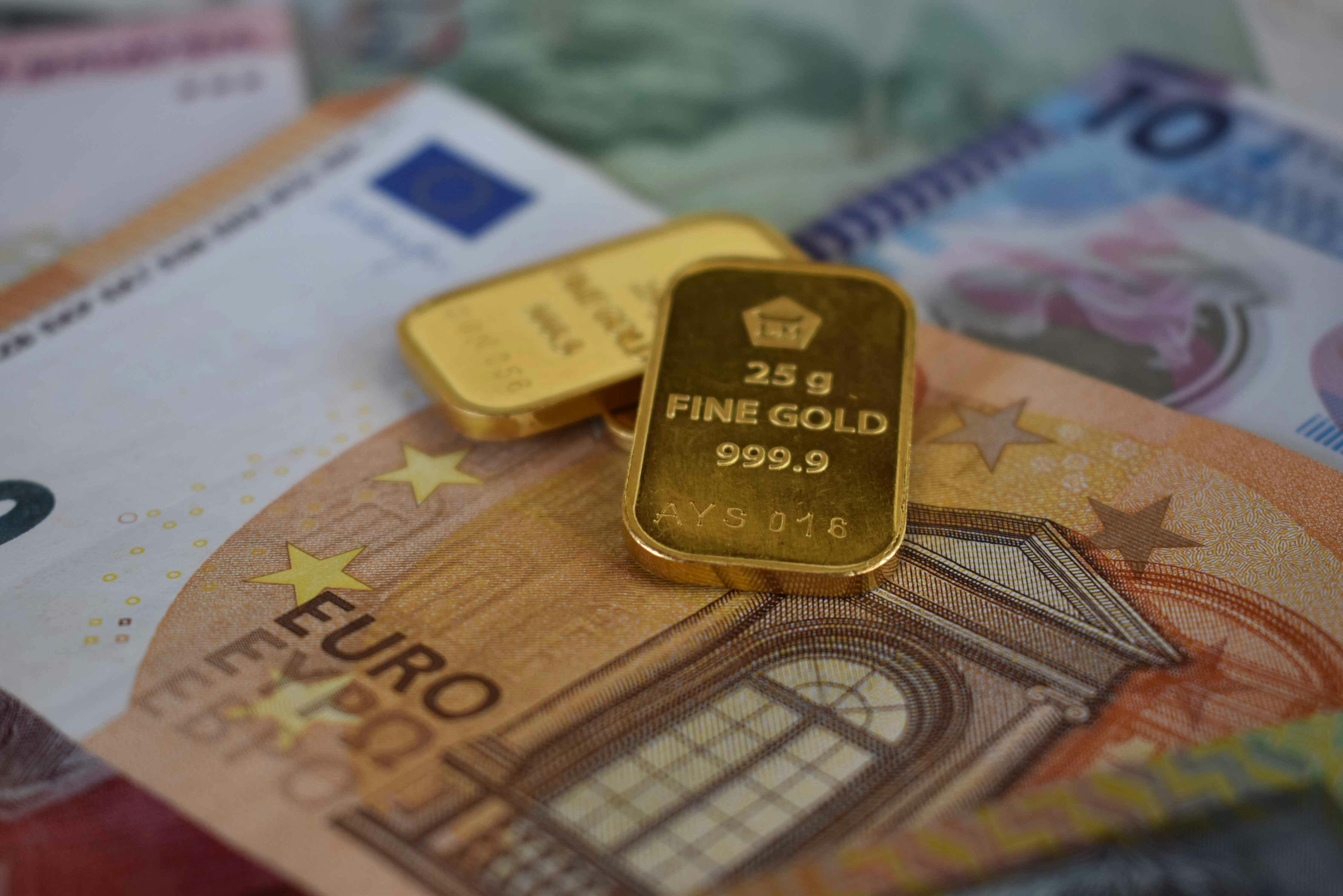 Gold and Banknotes · Free Stock Photo