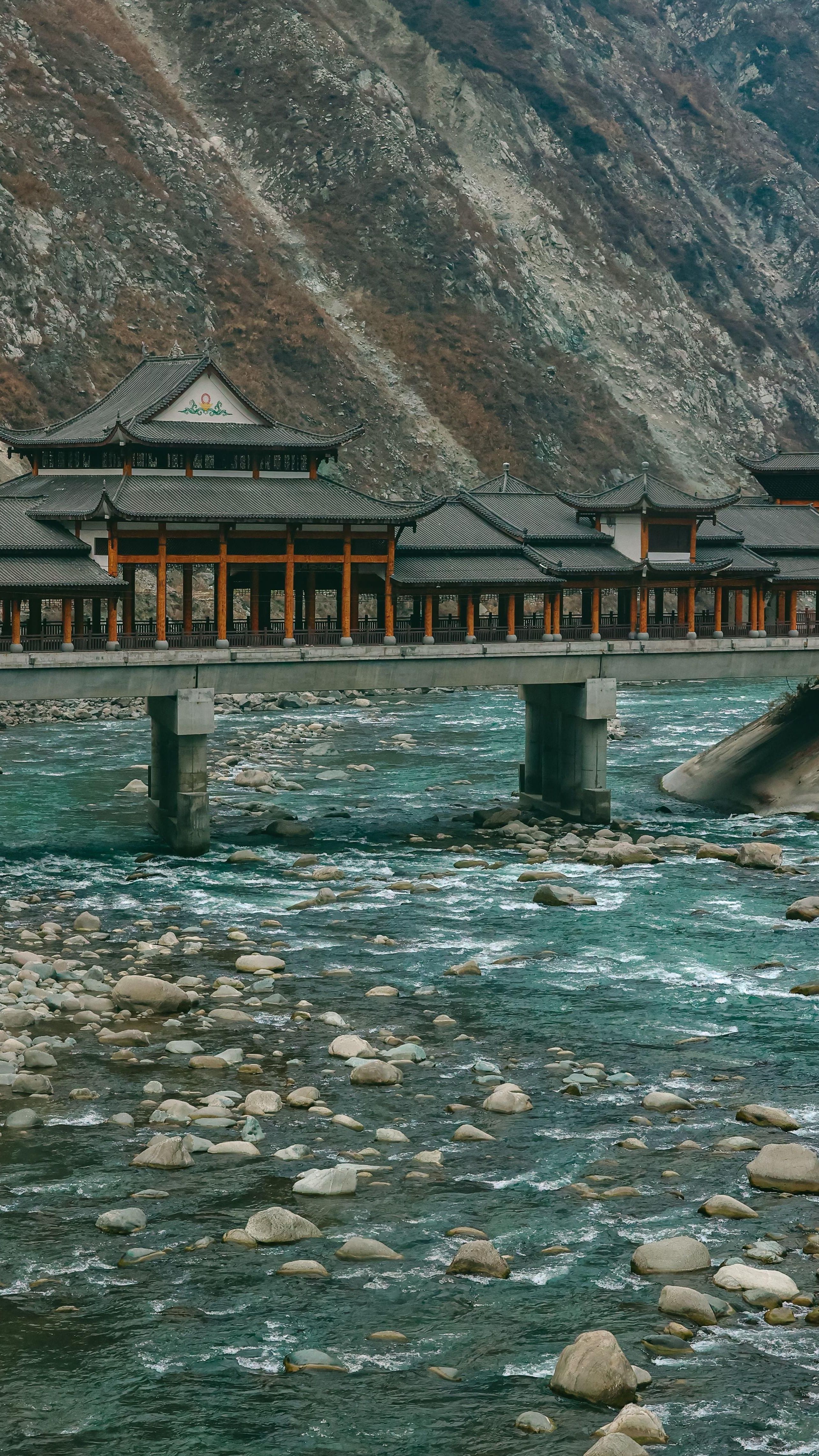 Traditional Buildings on a Pier in a Valley · Free Stock Photo