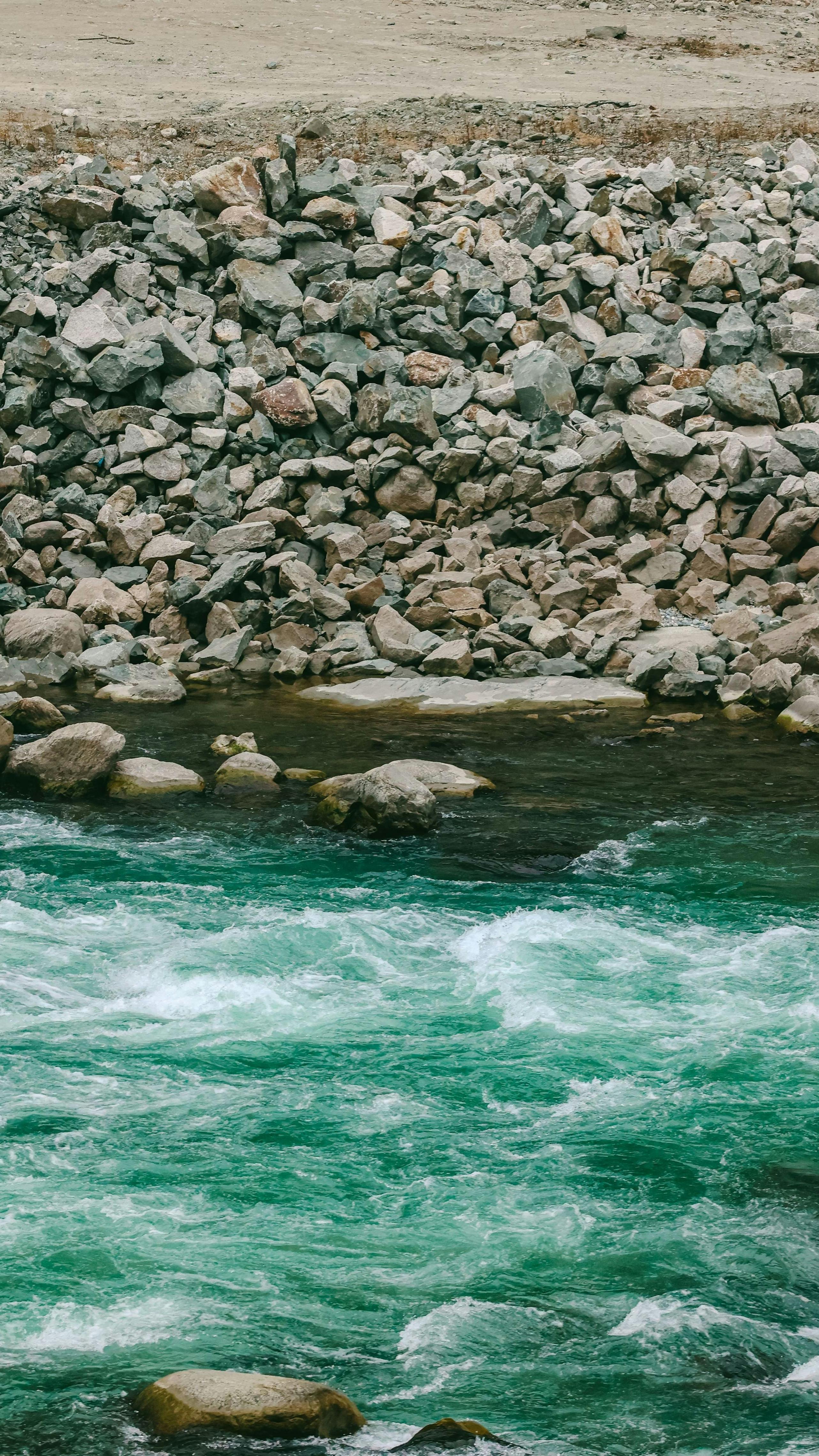 Flowing Water in Stream and Pebbles around · Free Stock Photo