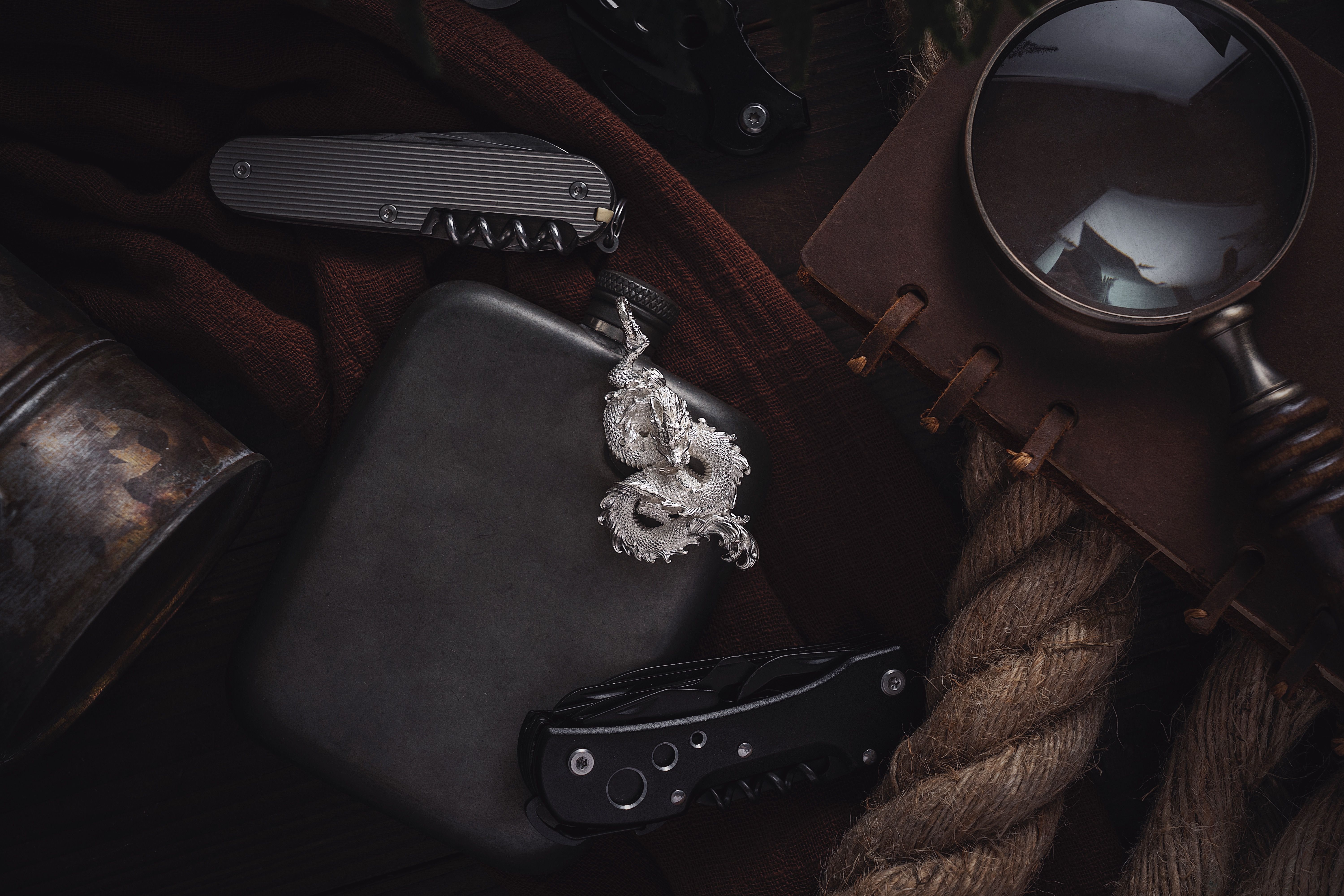 Vintage Dragon Key Chain and a Swiss Army Knife · Free Stock Photo