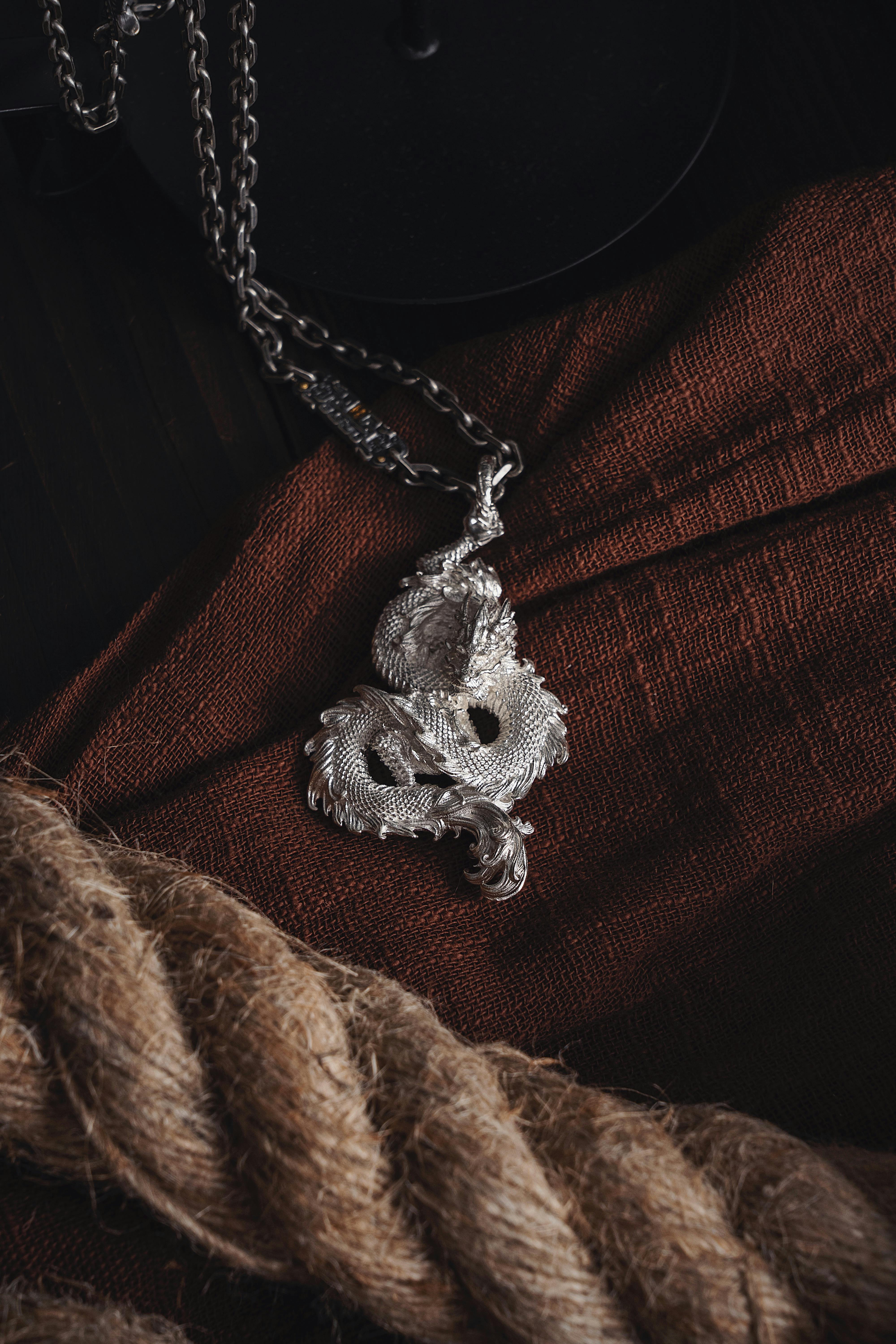 Vintage Dragon on a Chain and a Rope · Free Stock Photo