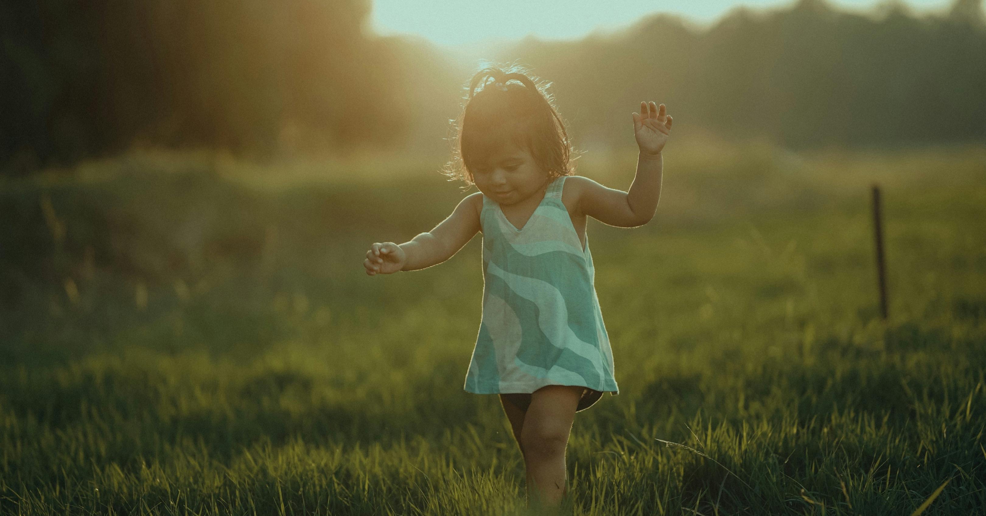 Girl in Grassfield in Summer · Free Stock Photo