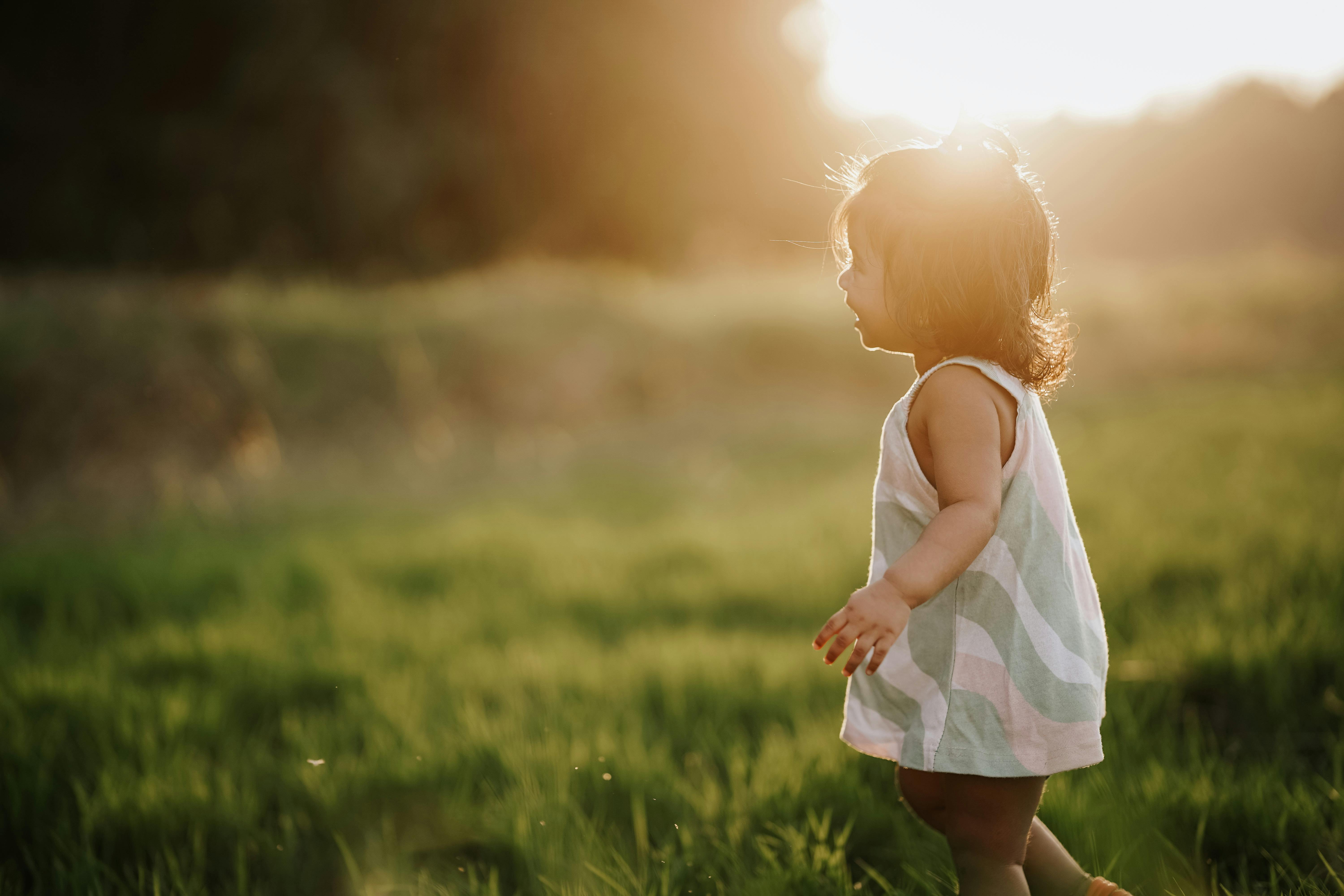 Cute Little Girl on Meadow · Free Stock Photo