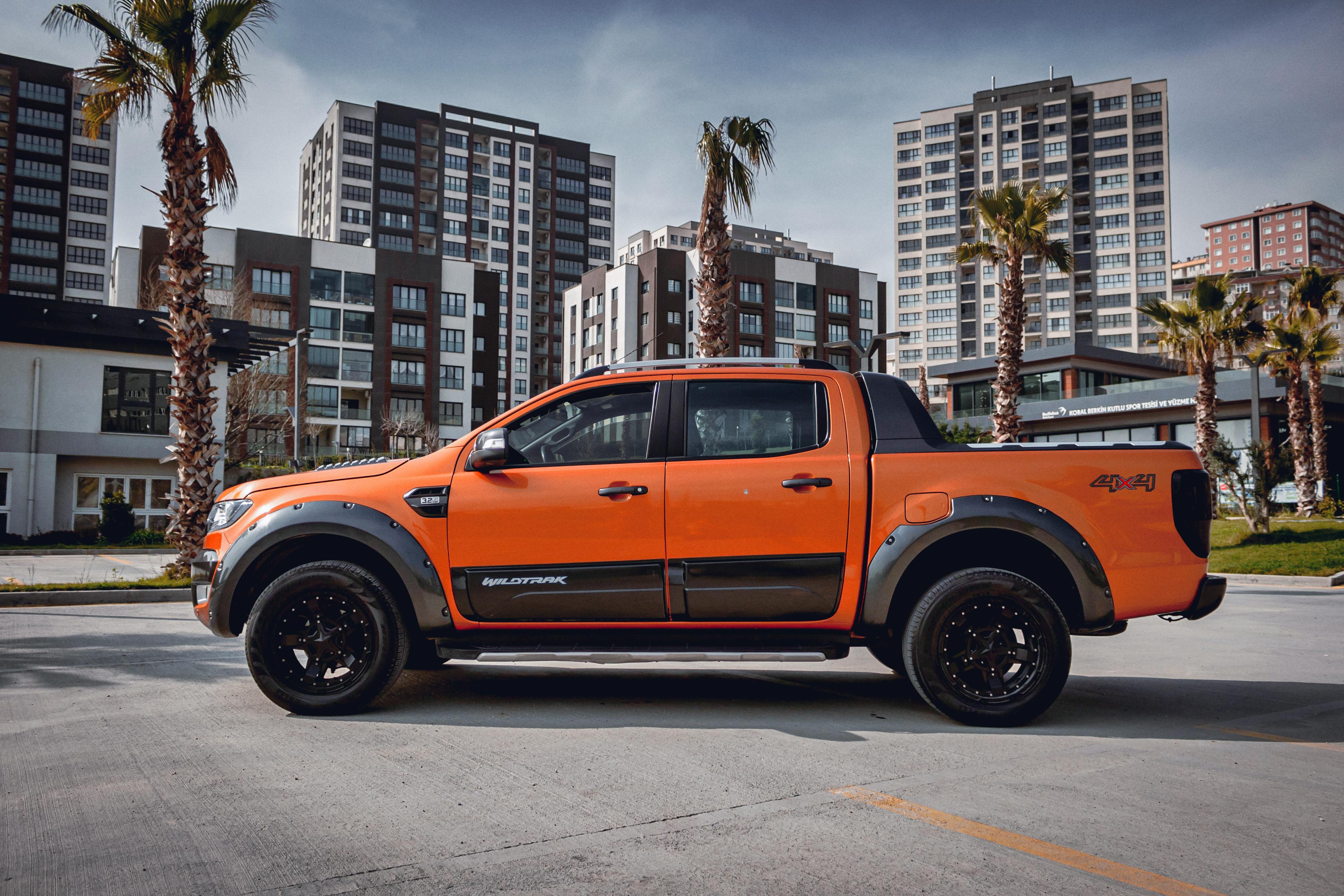 Orange Ford Ranger in City · Free Stock Photo