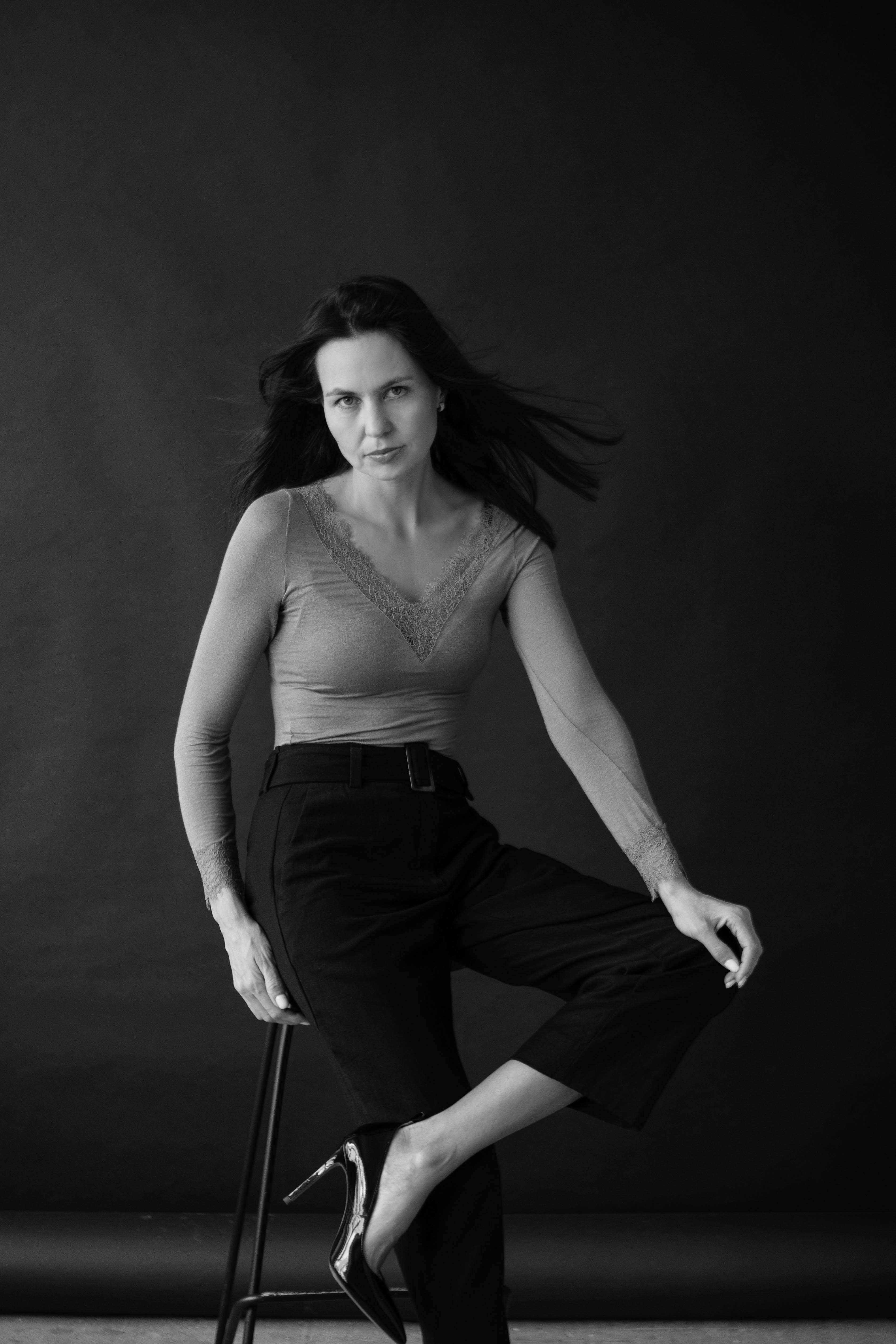 Elegant Woman Posing in Studio · Free Stock Photo