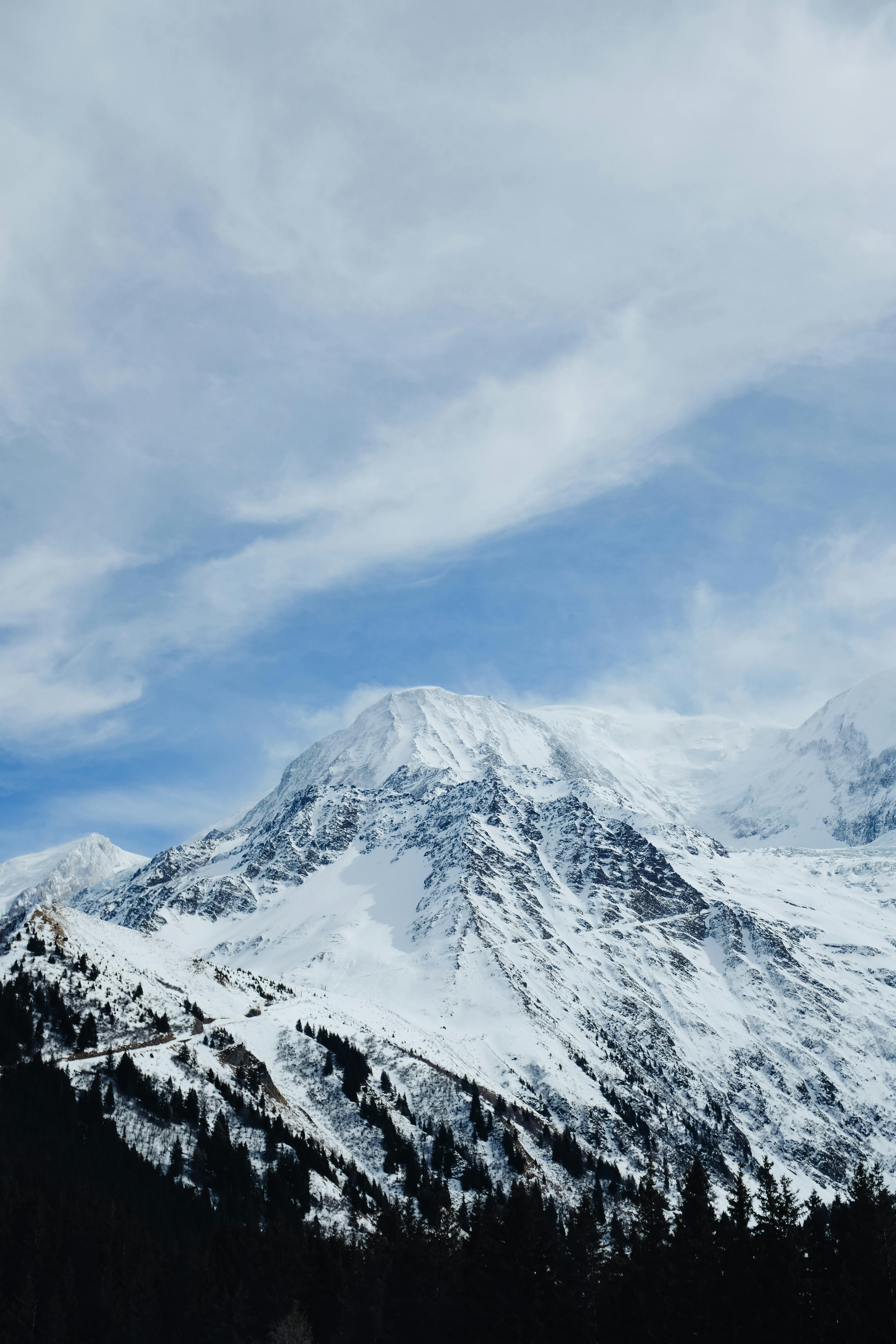 Gray Mountains Under Gray Sky at Daytime · Free Stock Photo
