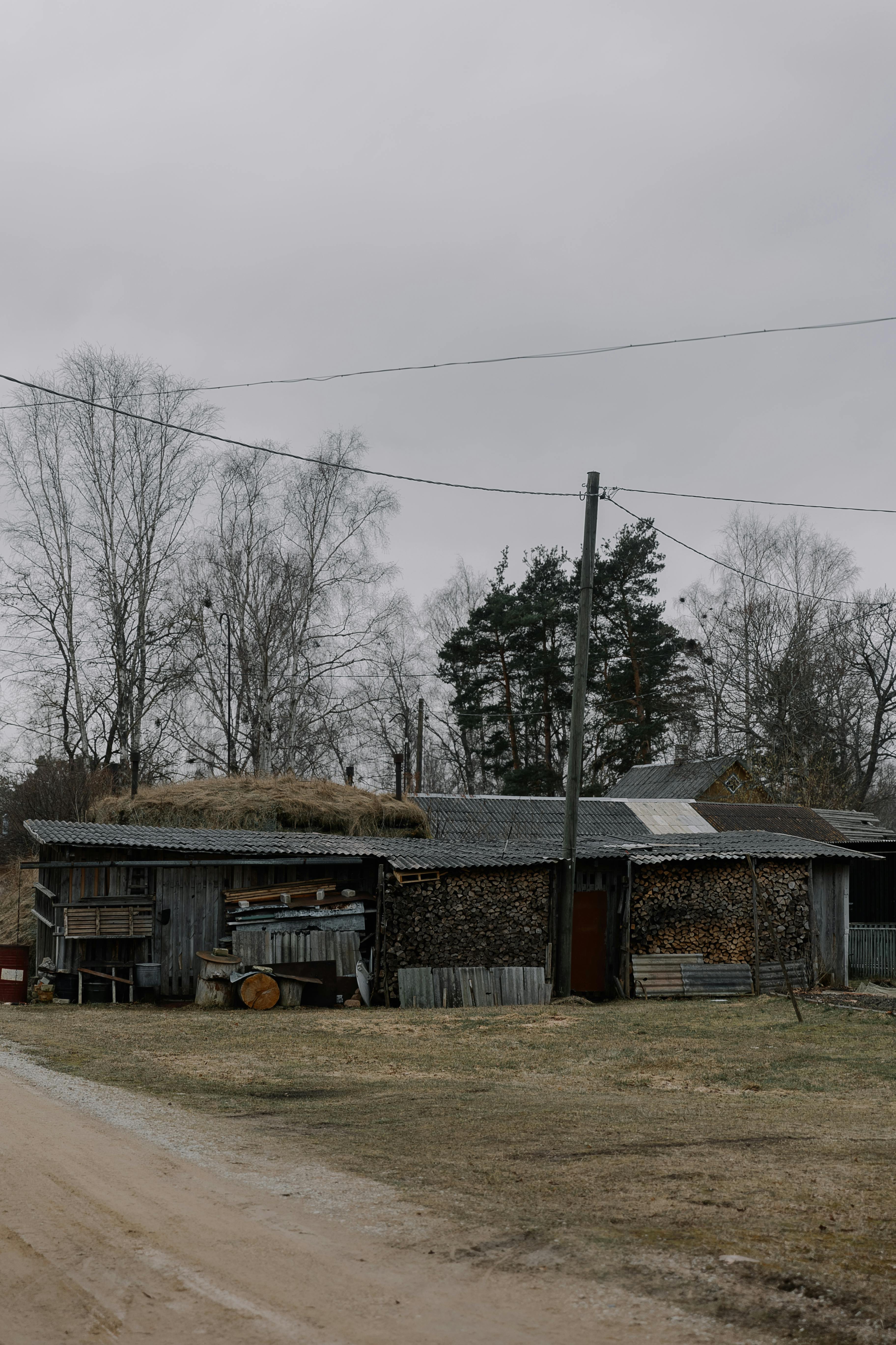 Overcast over Abandoned Farm · Free Stock Photo