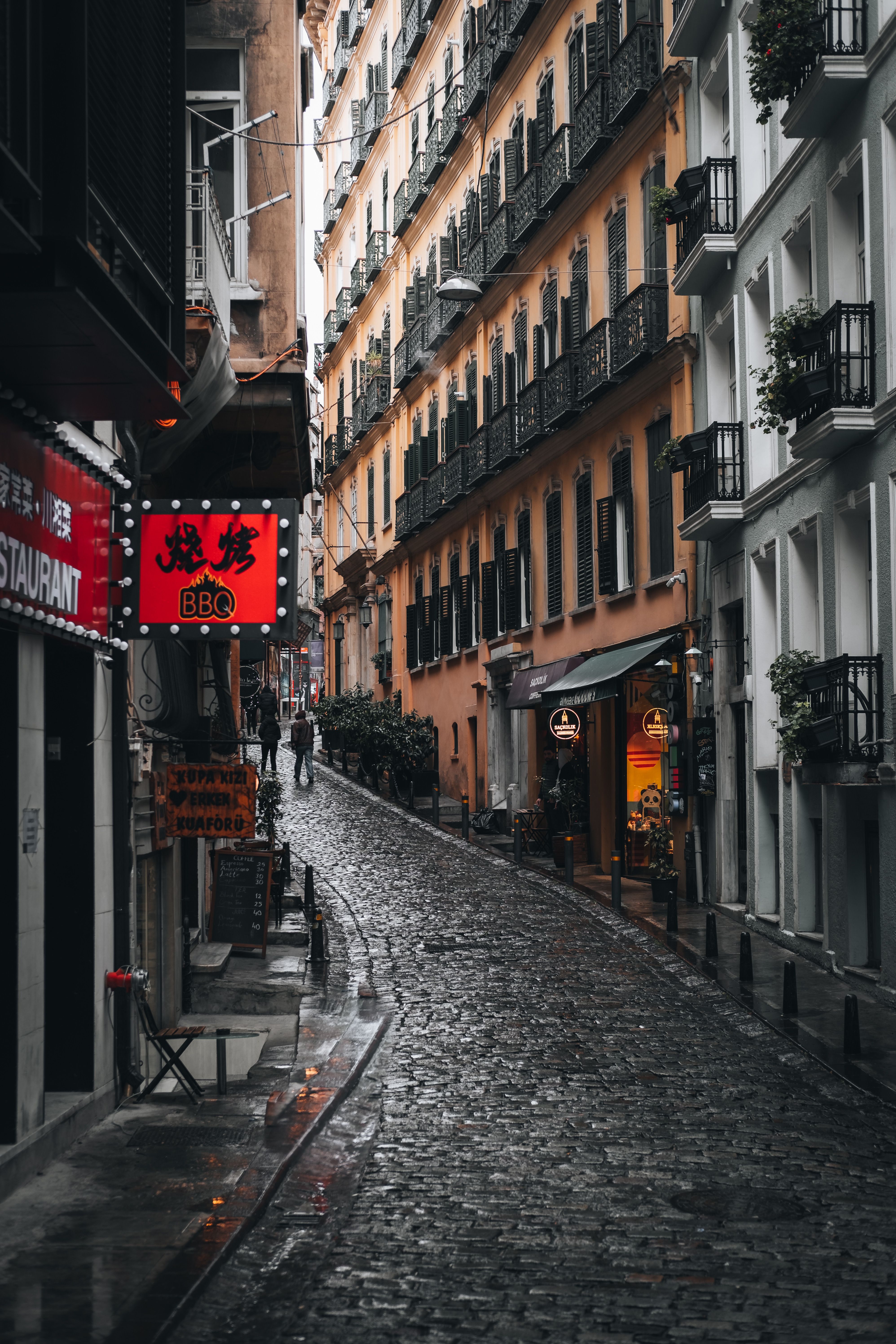 A street with a red sign in it · Free Stock Photo
