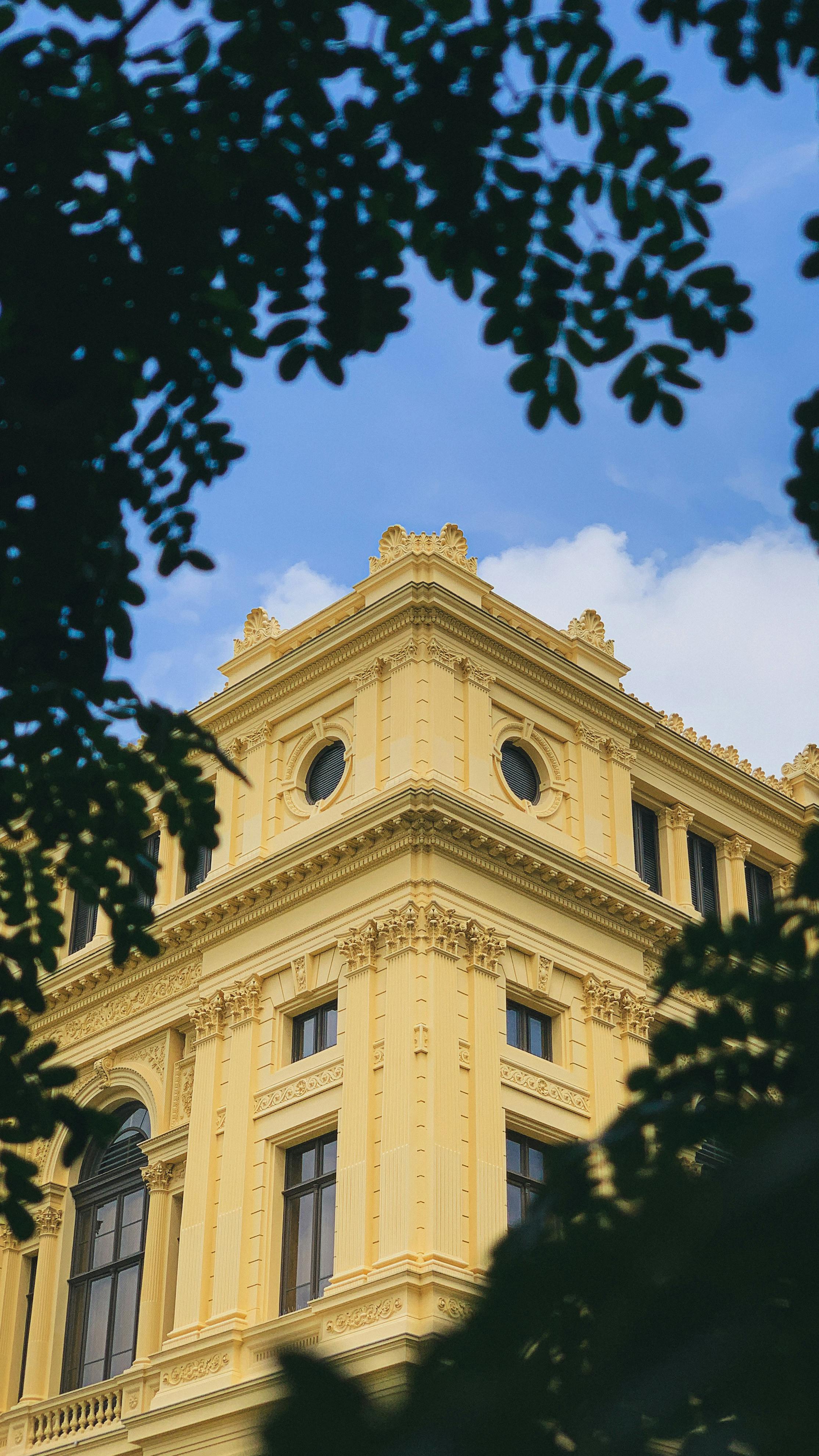 Ornamented Building with Tower · Free Stock Photo