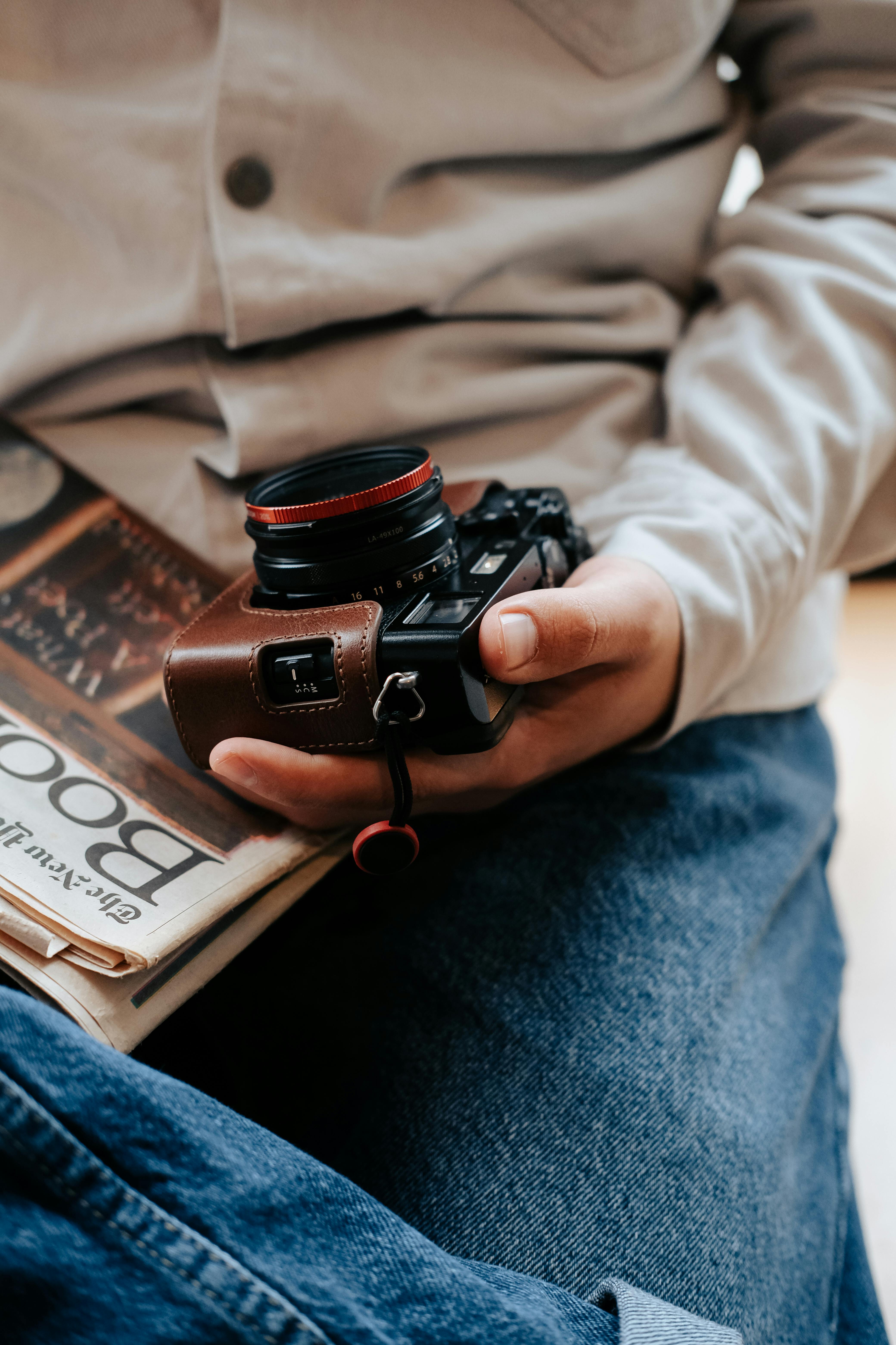Hand Holding a Vintage Camera · Free Stock Photo