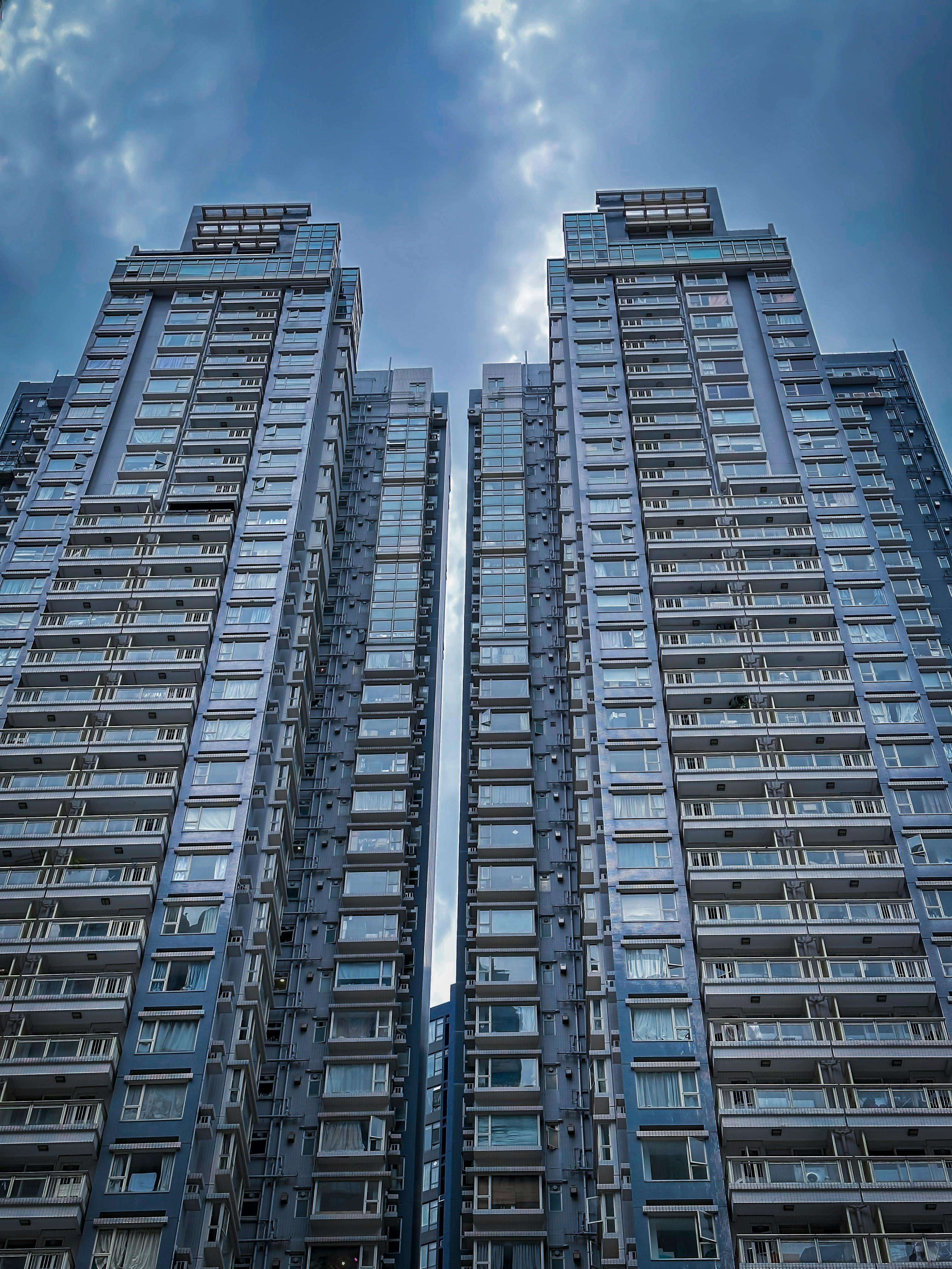 High Rise Building Under Cloudy Sky at Daytime · Free Stock Photo