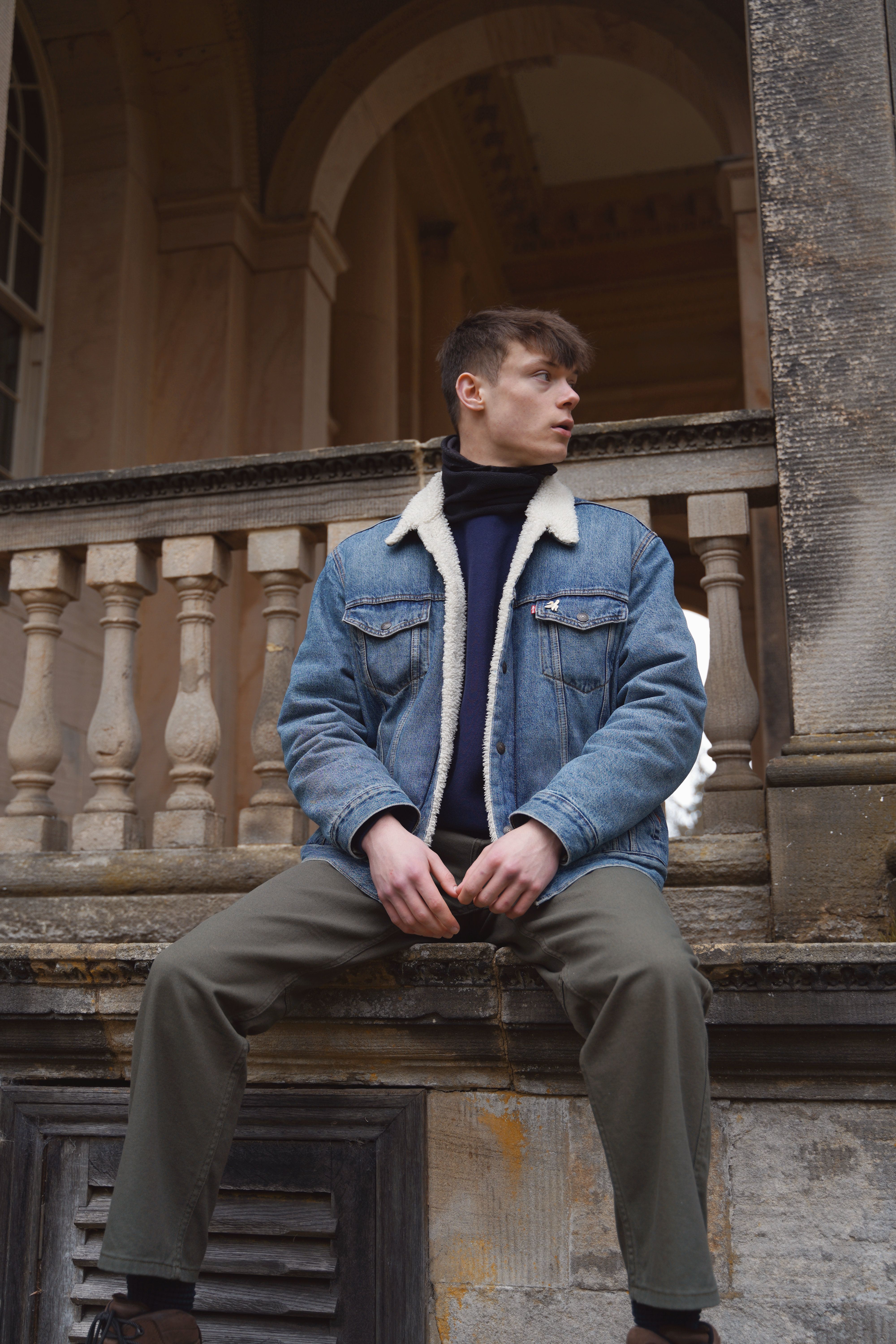 Sitting Man in Jean Jacket · Free Stock Photo
