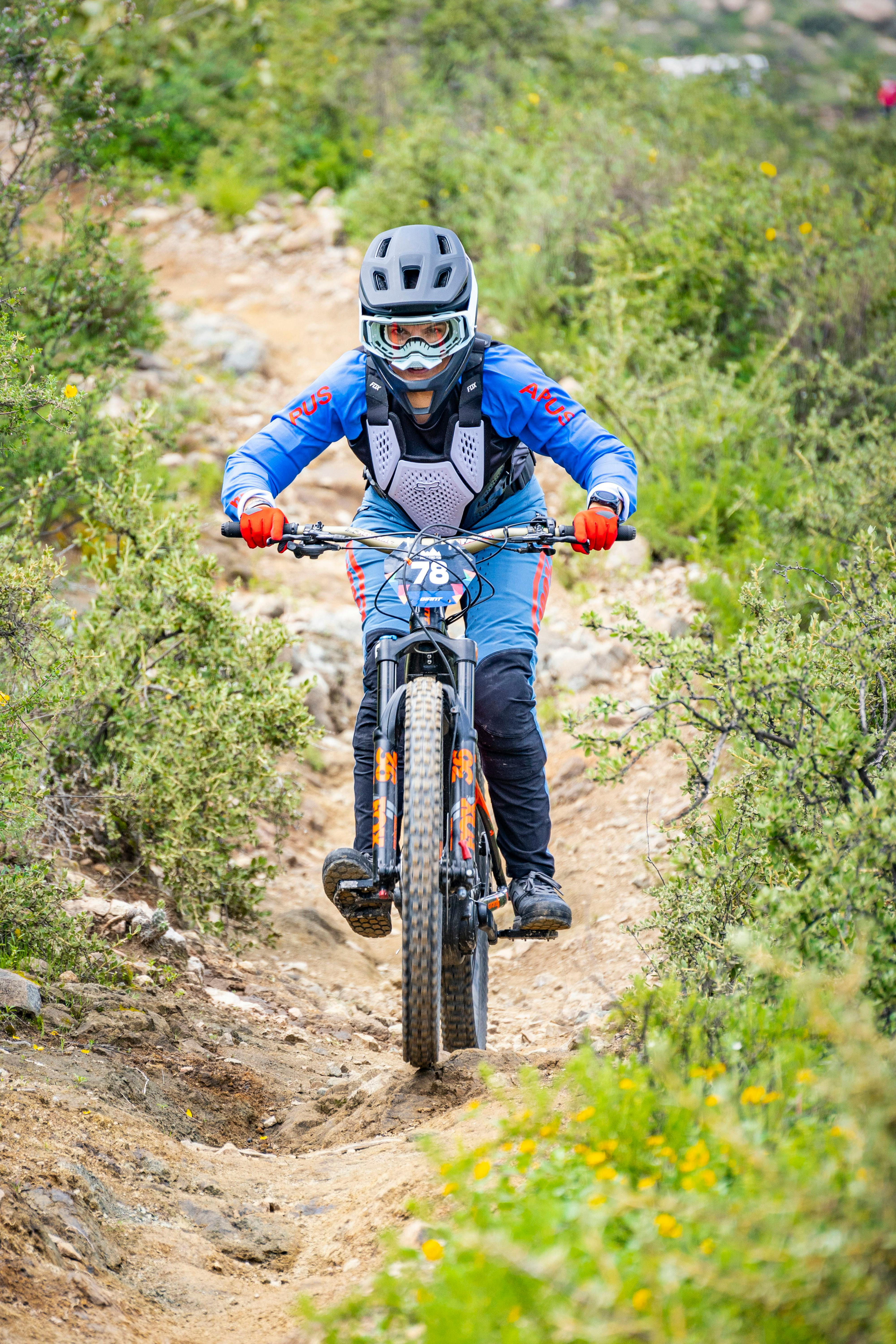 Photo of a Woman Mountain Bike Racing · Free Stock Photo