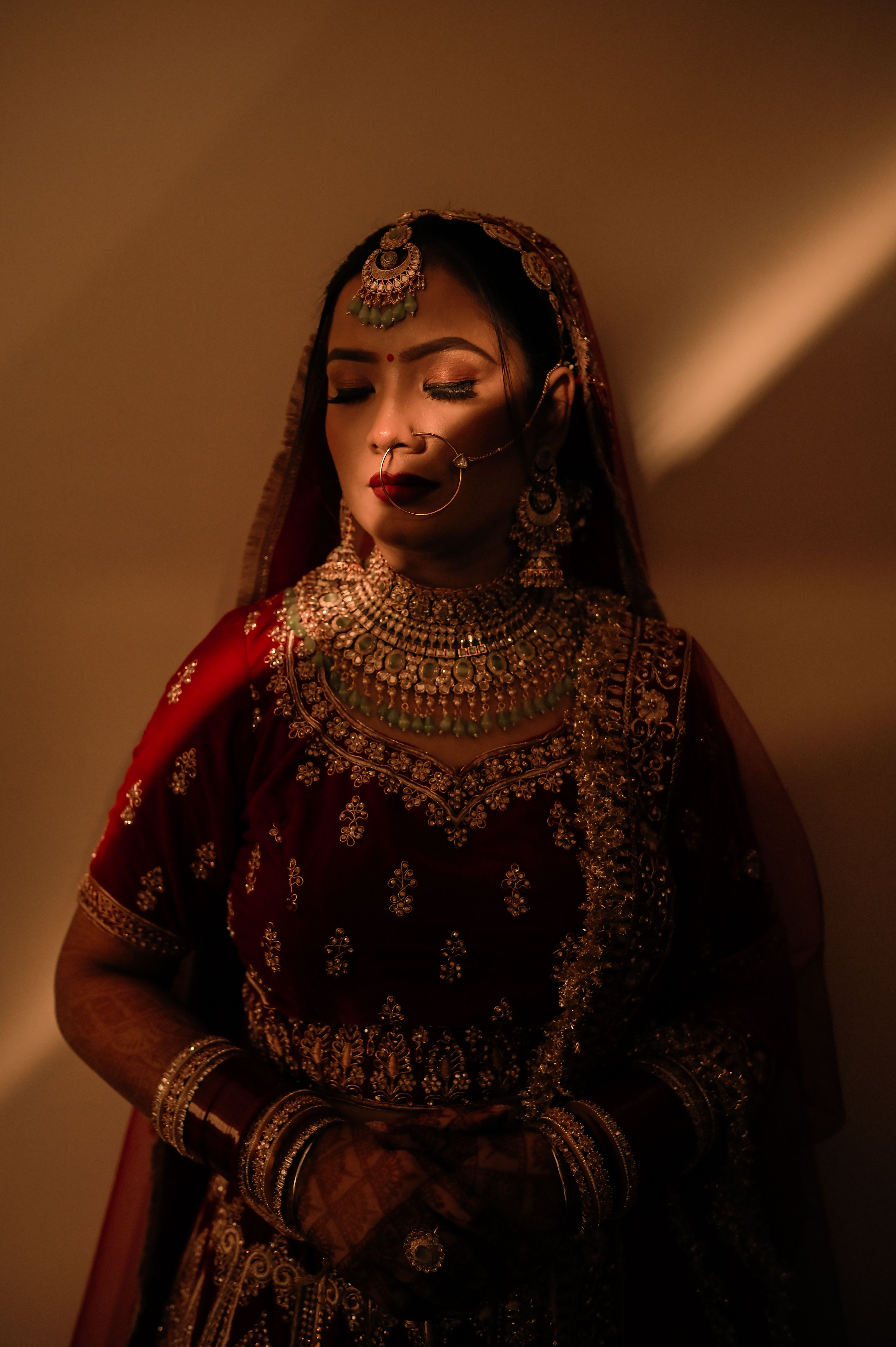 A Bride in a Traditional Costume in Shadow · Free Stock Photo