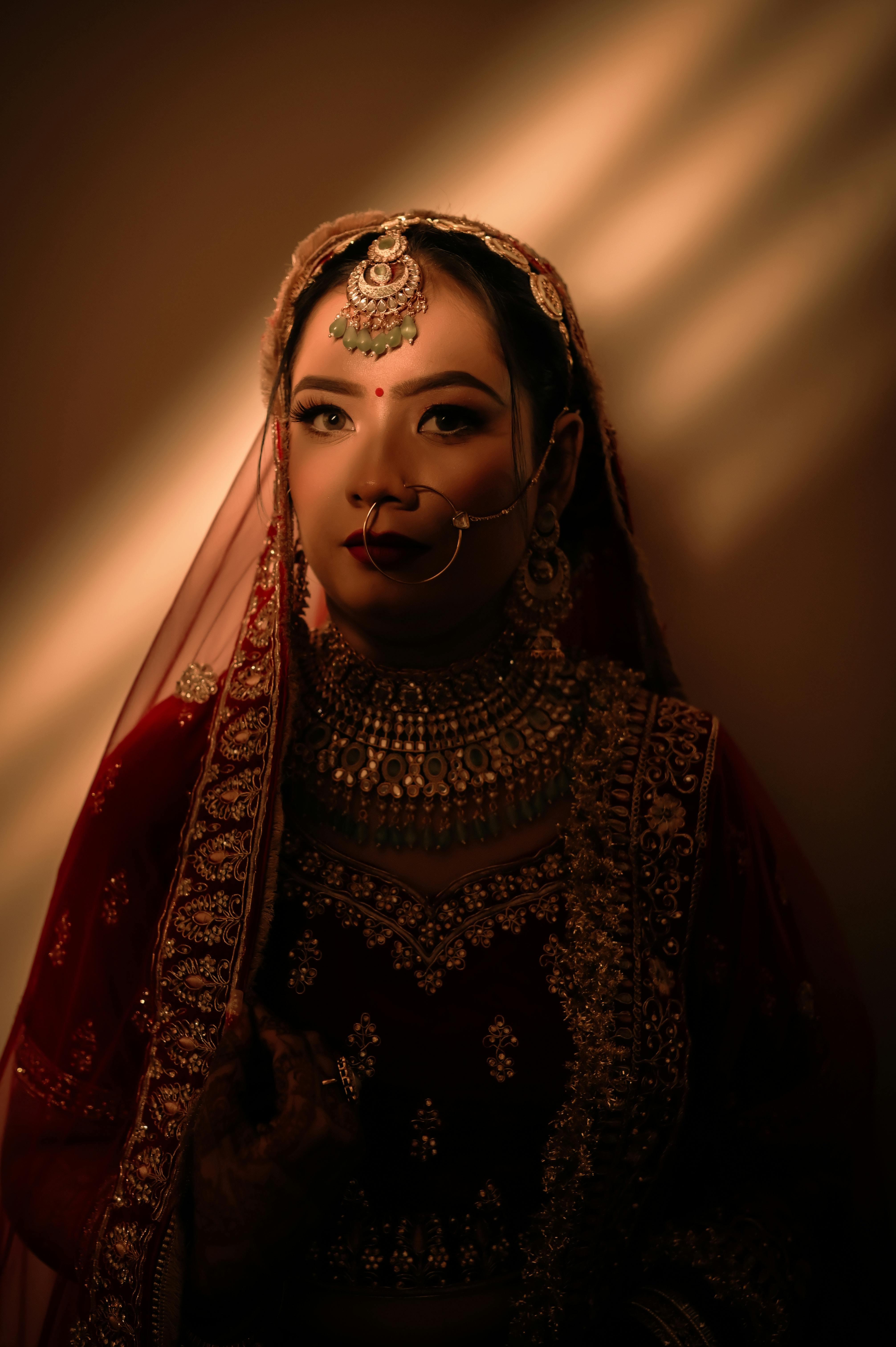 Woman Posing in Traditional Clothing · Free Stock Photo