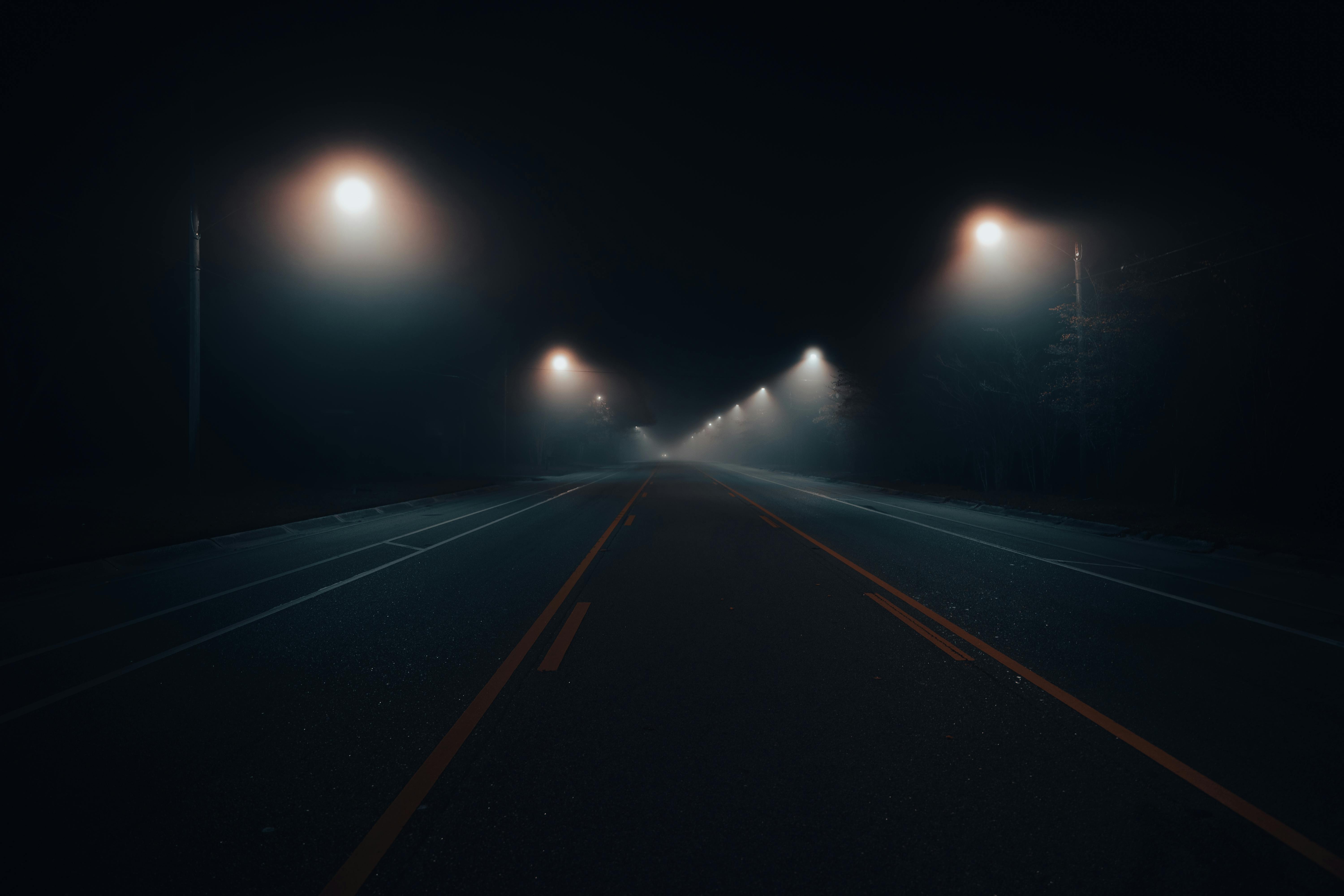 An Empty Asphalt Road in City at Night · Free Stock Photo