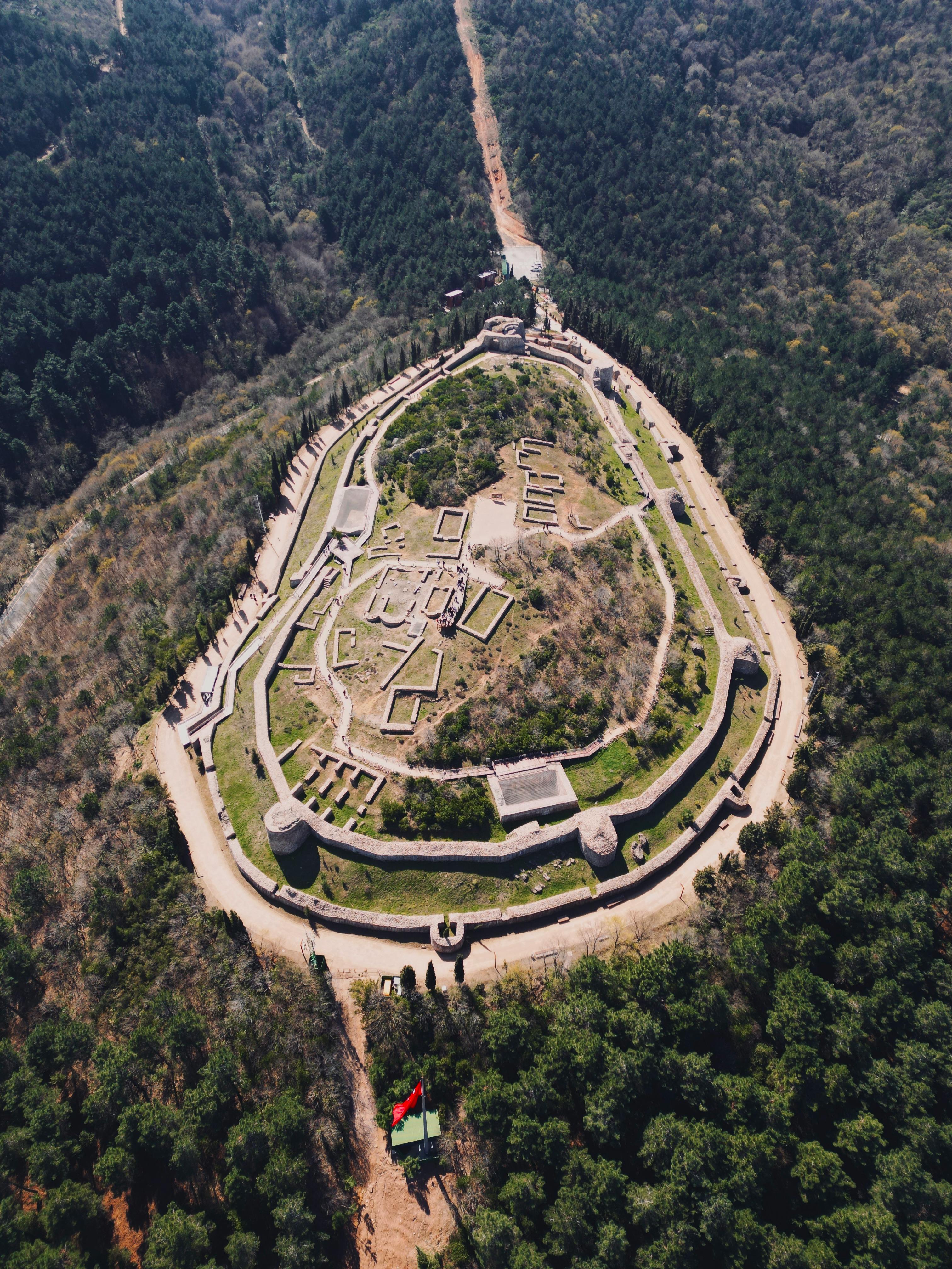 Drone Shot of Fortification in Forest · Free Stock Photo