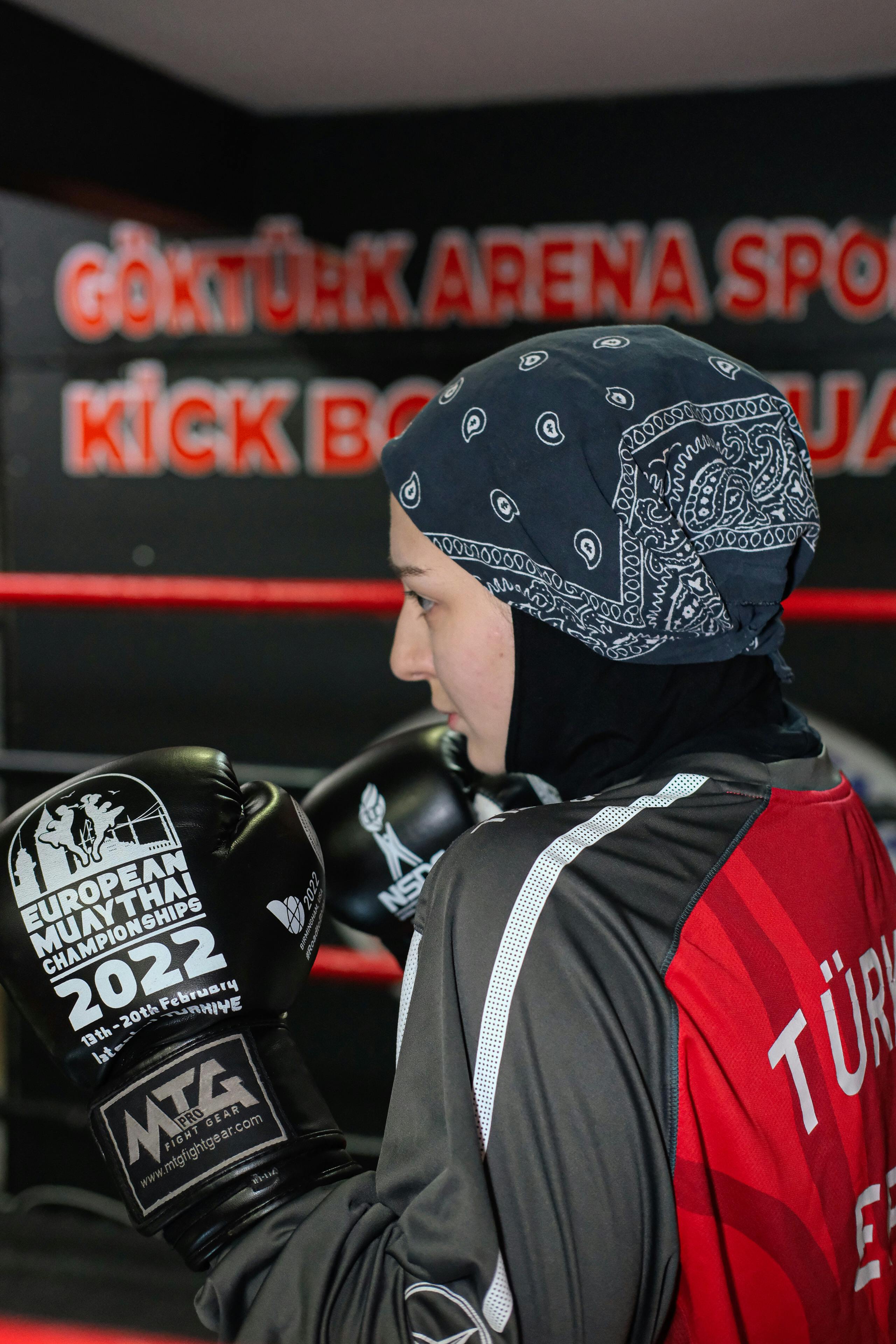 Woman in Hijab Standing in Boxing Ring · Free Stock Photo