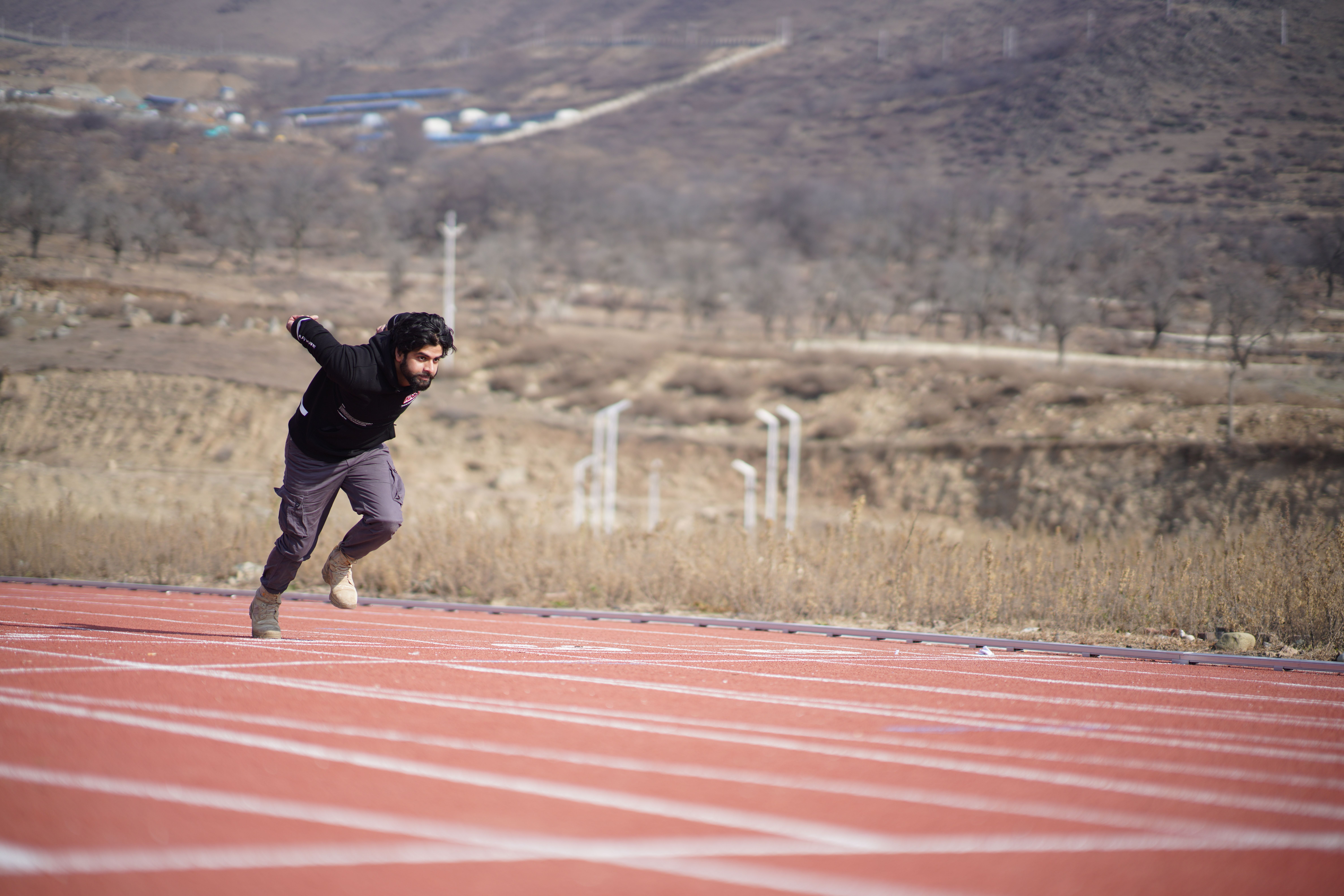 Man Running along Track in Countryside · Free Stock Photo