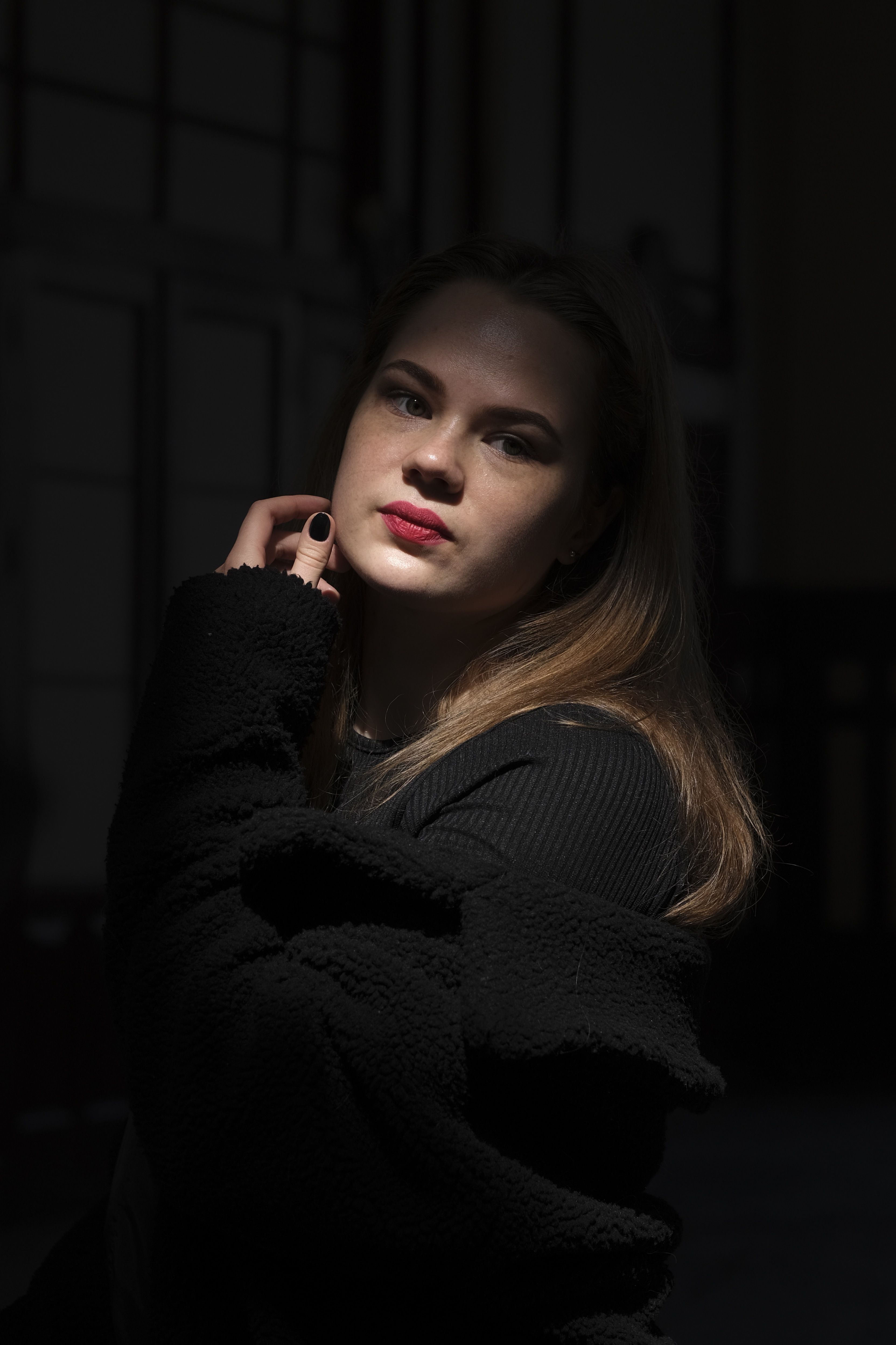 Woman Posing in Darkness · Free Stock Photo