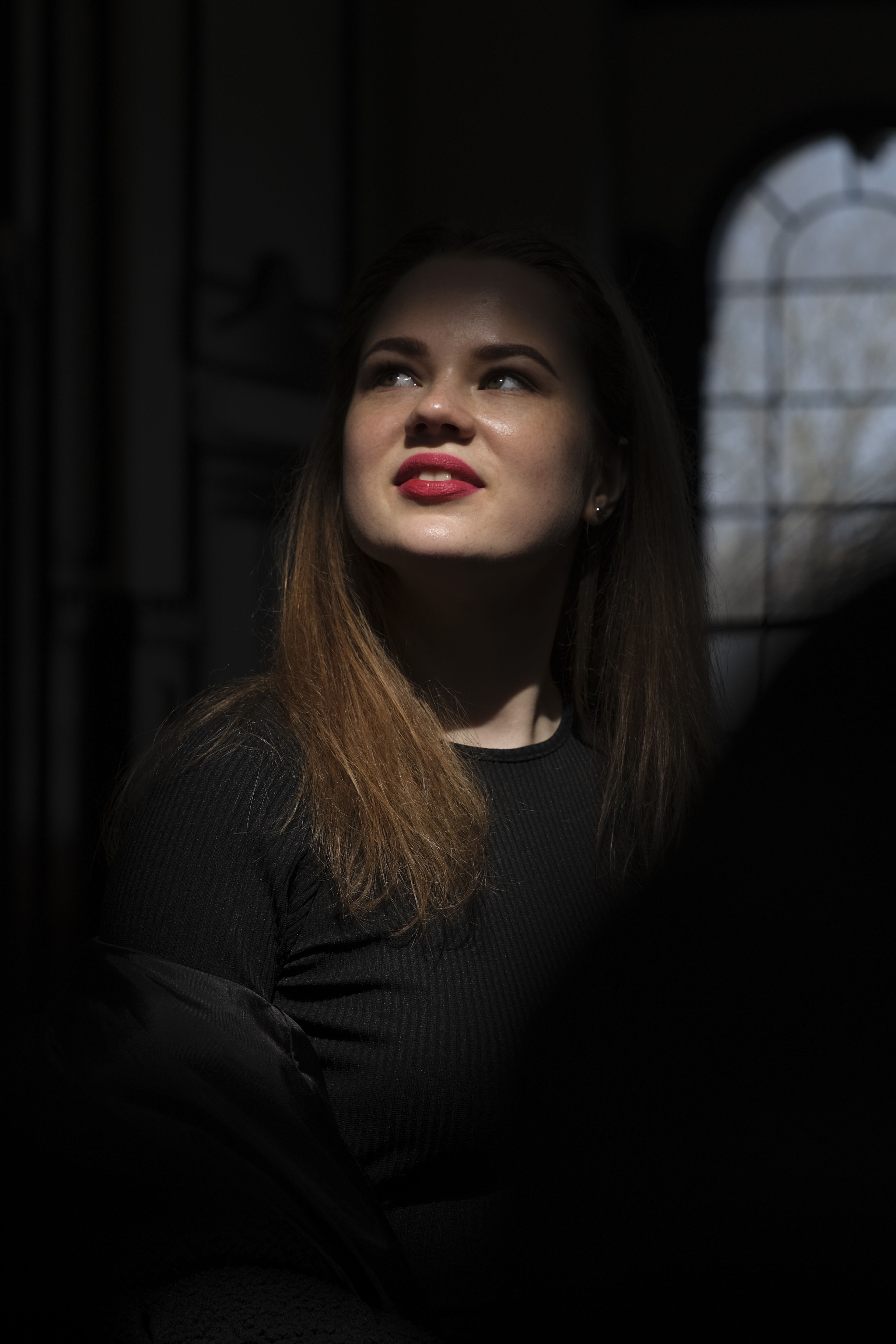 Woman Posing in Darkness · Free Stock Photo