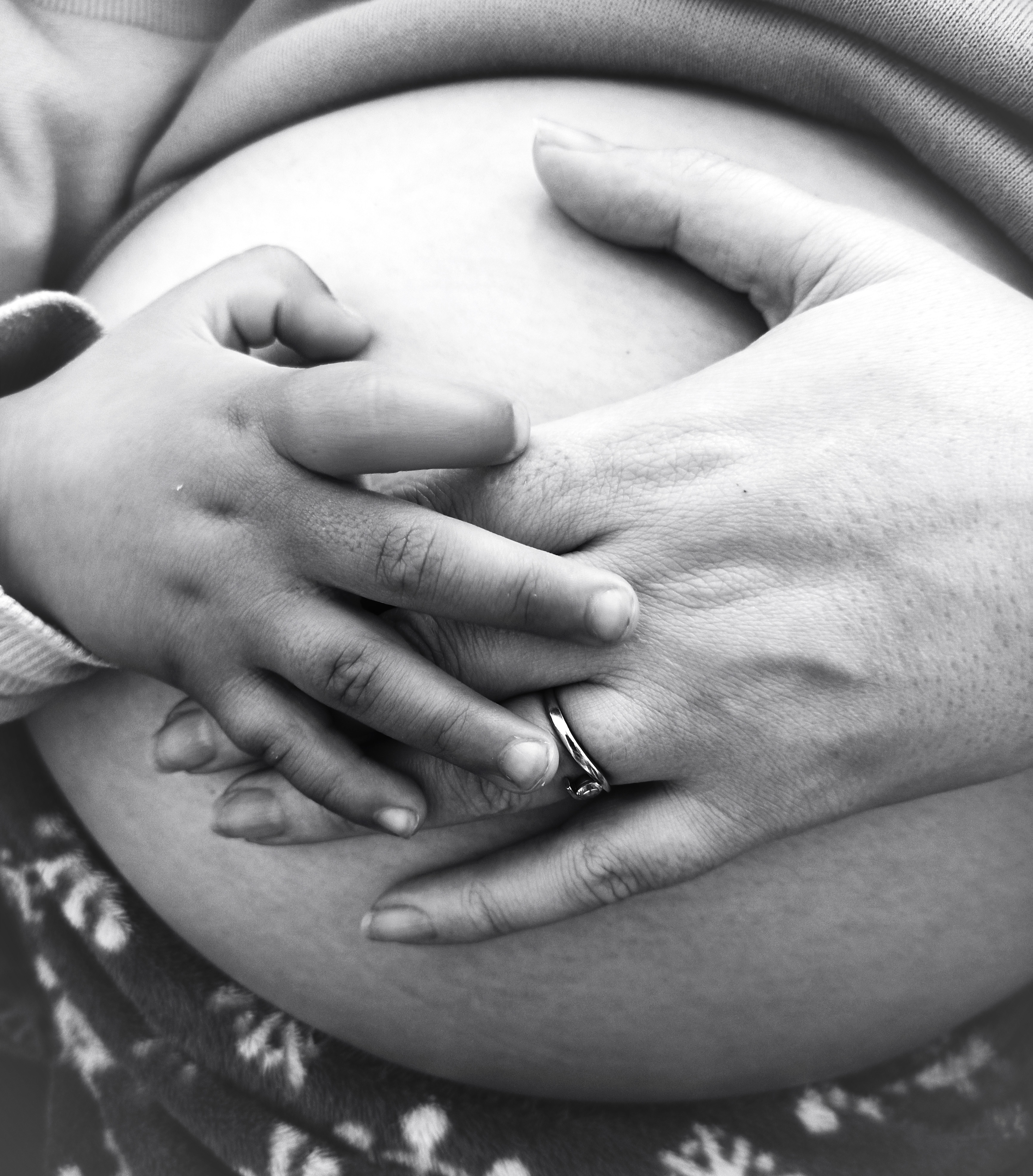 Hands on Pregnant Woman Stomach · Free Stock Photo