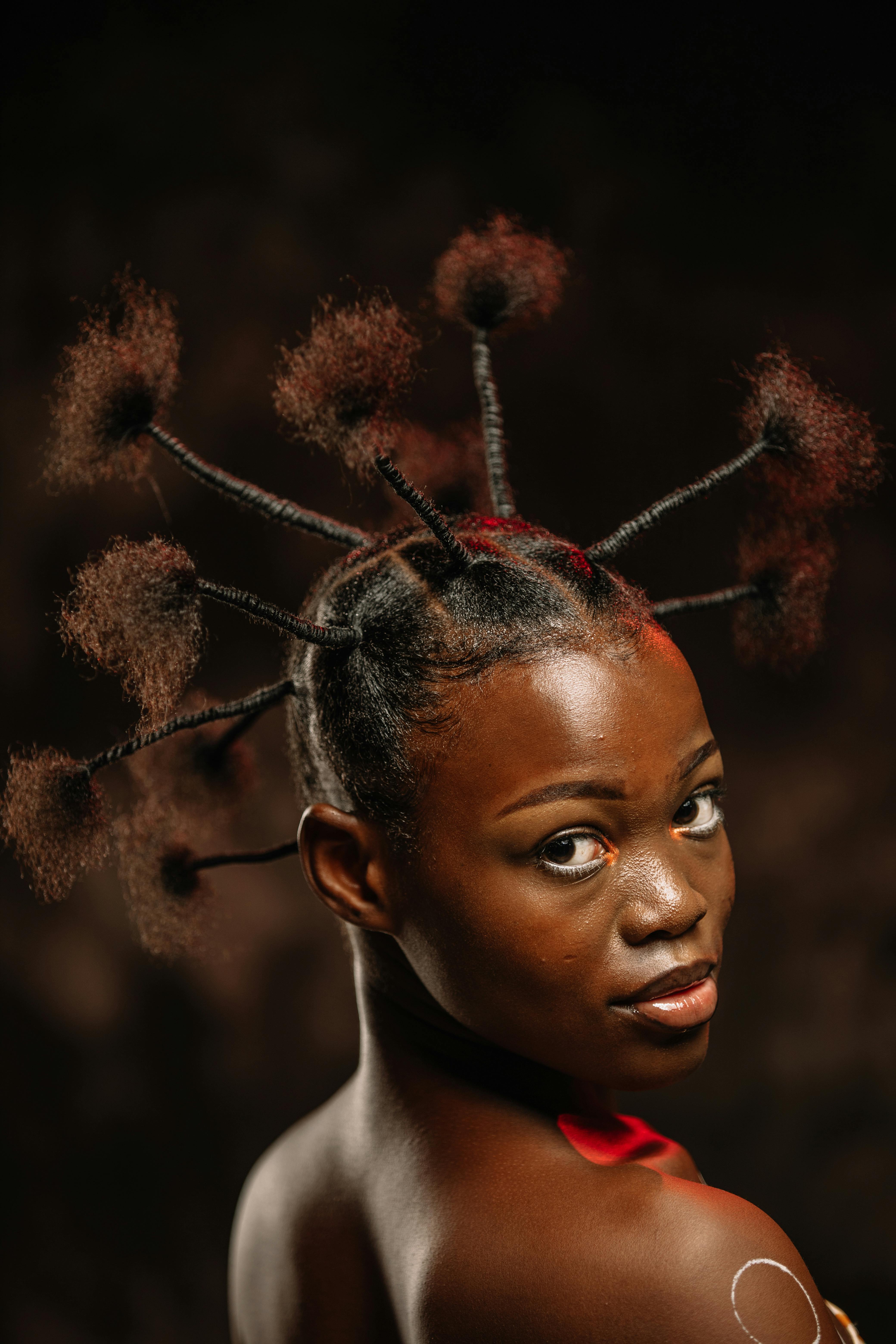 Portrait of a Woman Looking over her Shoulder · Free Stock Photo