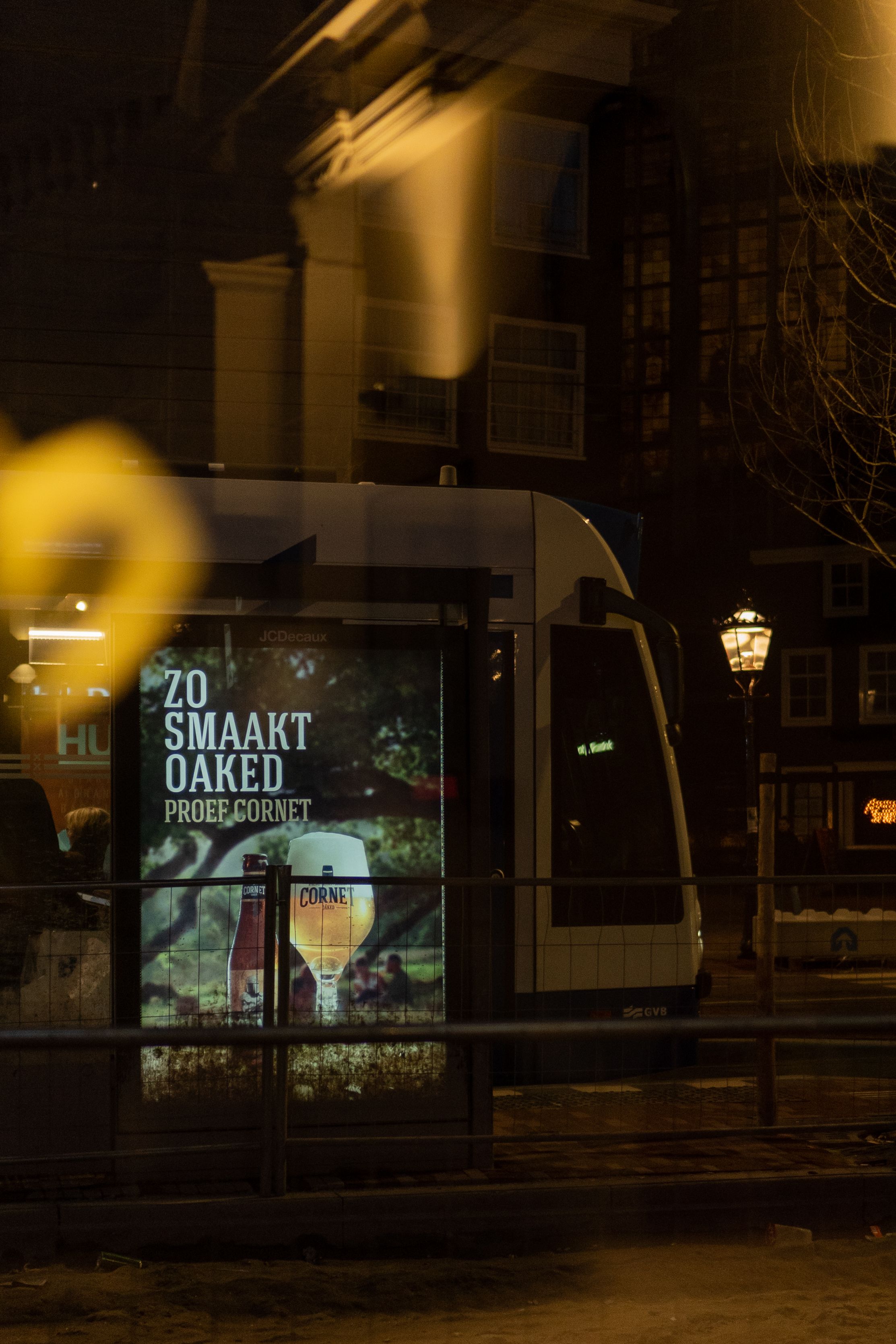 Advertisement and Train at Night · Free Stock Photo