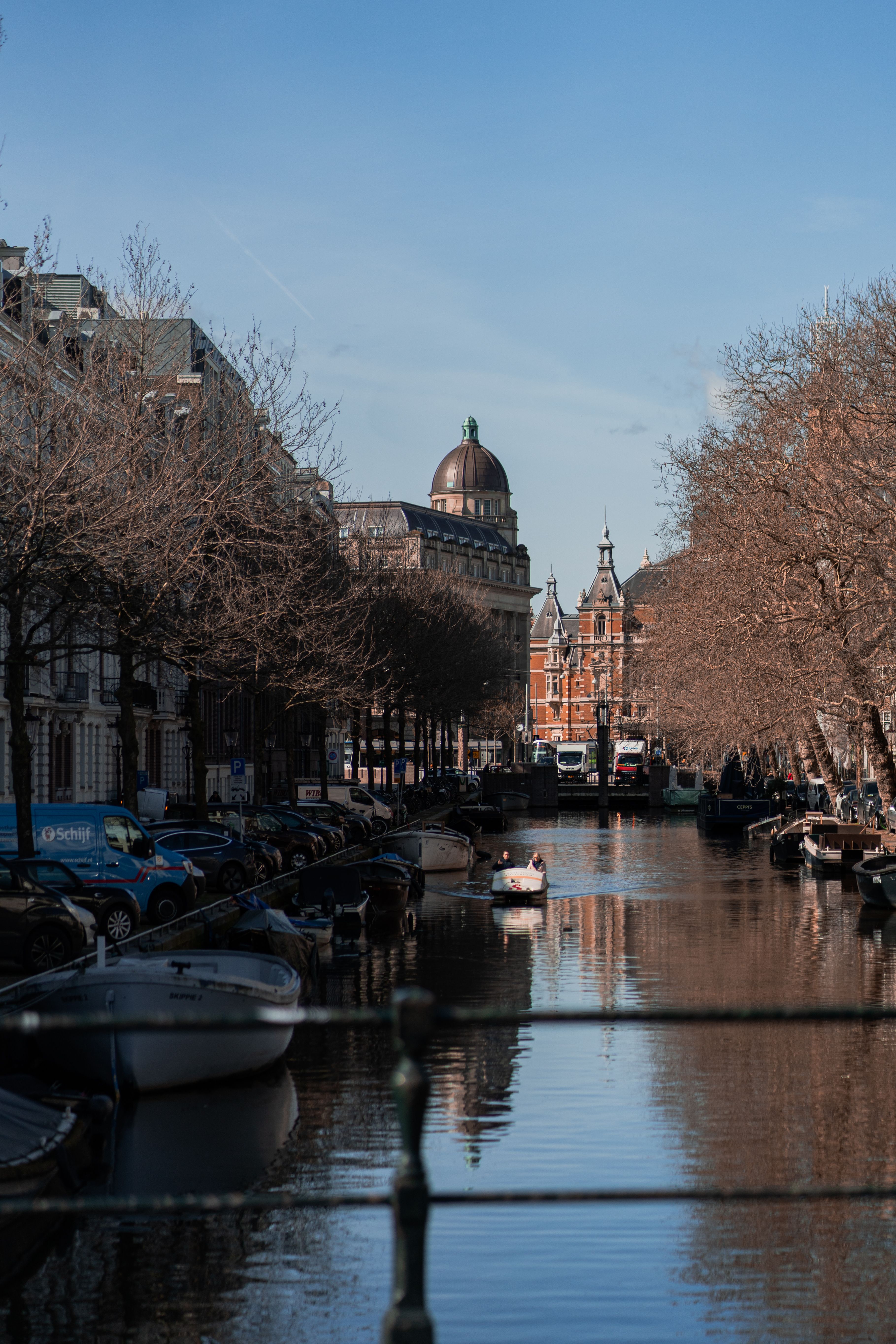 Boats Moored on the Sides of the Canal in Amsterdam, the Netherlands ...