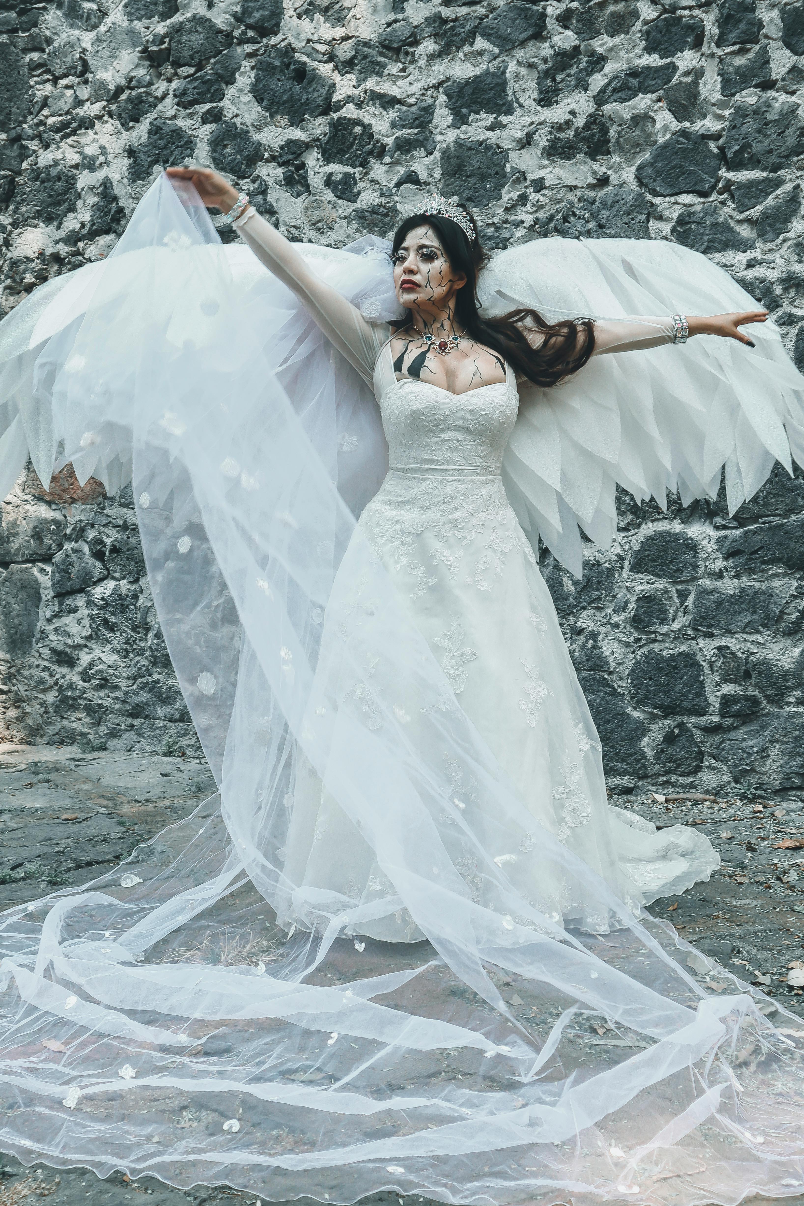 Woman in an Angel Costume · Free Stock Photo
