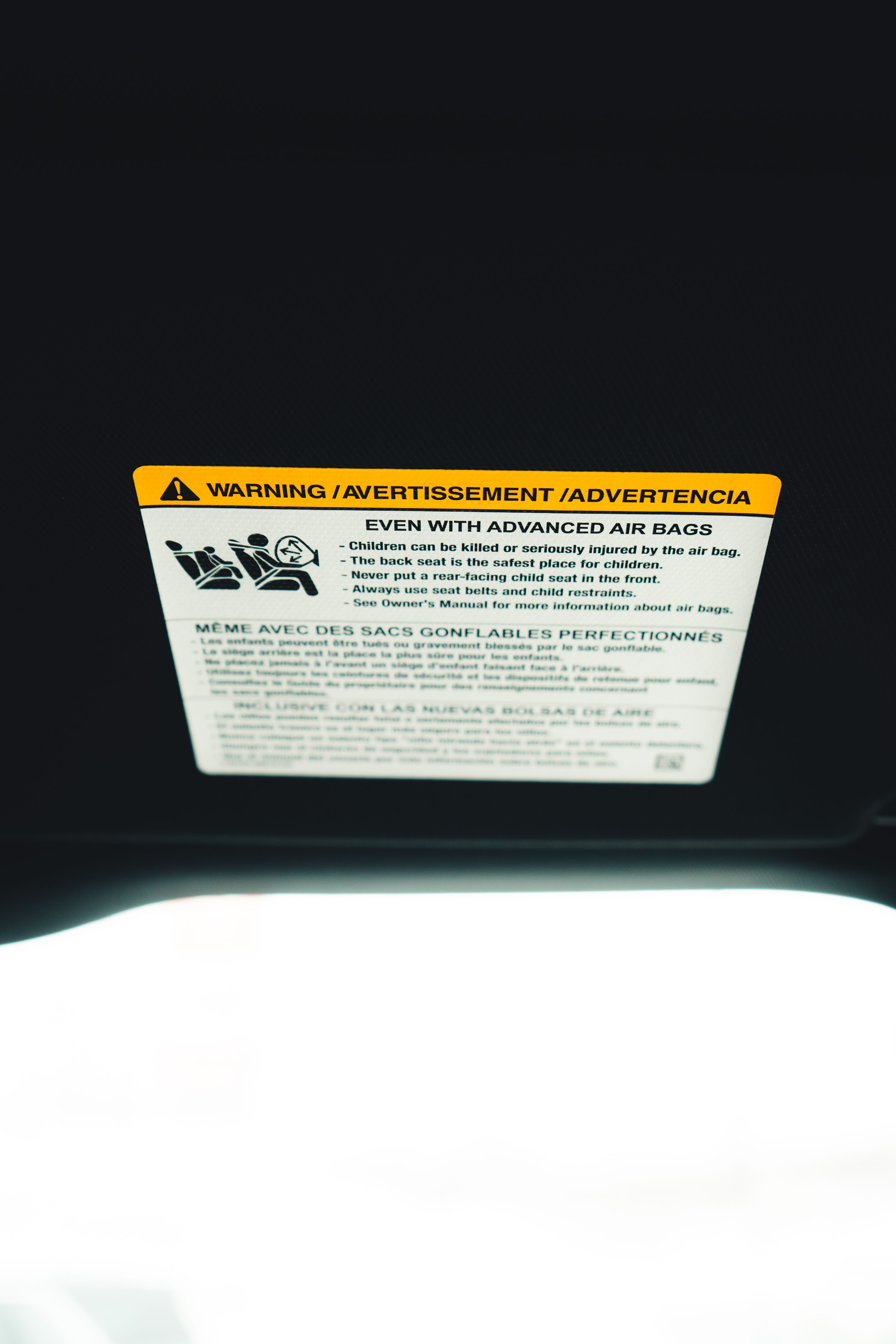 Warning Sticker Placed in Roof of Car · Free Stock Photo
