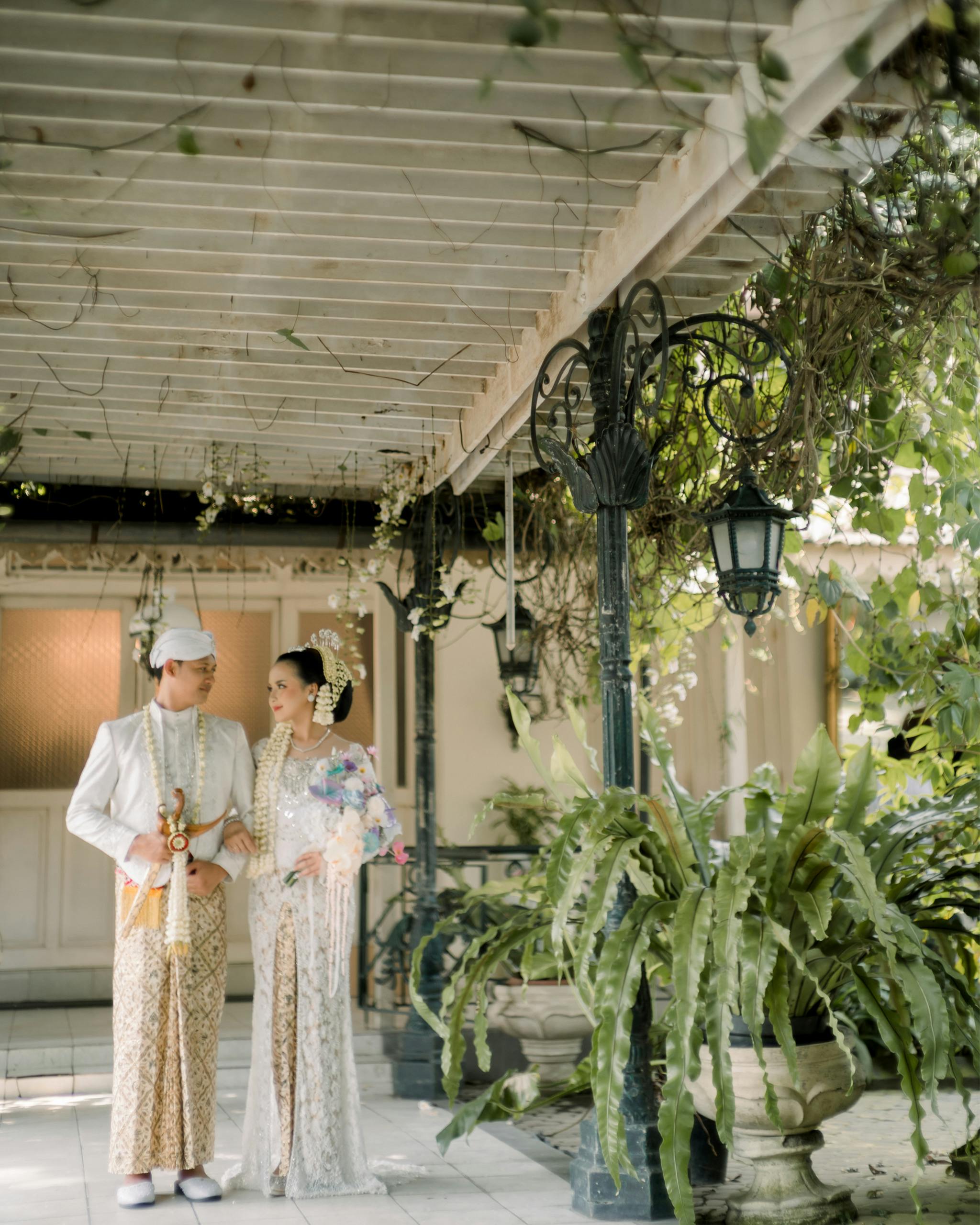Couple in Traditional Javanese Wedding Clothes · Free Stock Photo