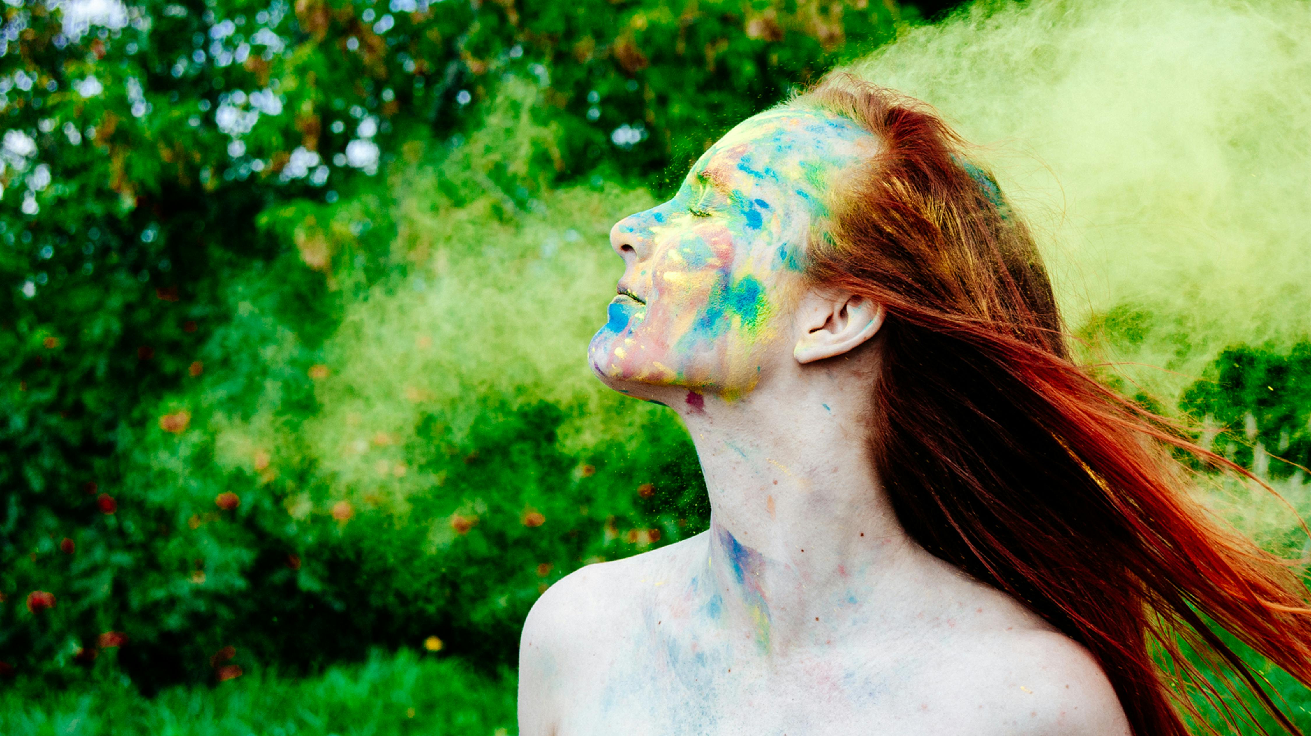 Woman with Colorful Powder on her Face · Free Stock Photo