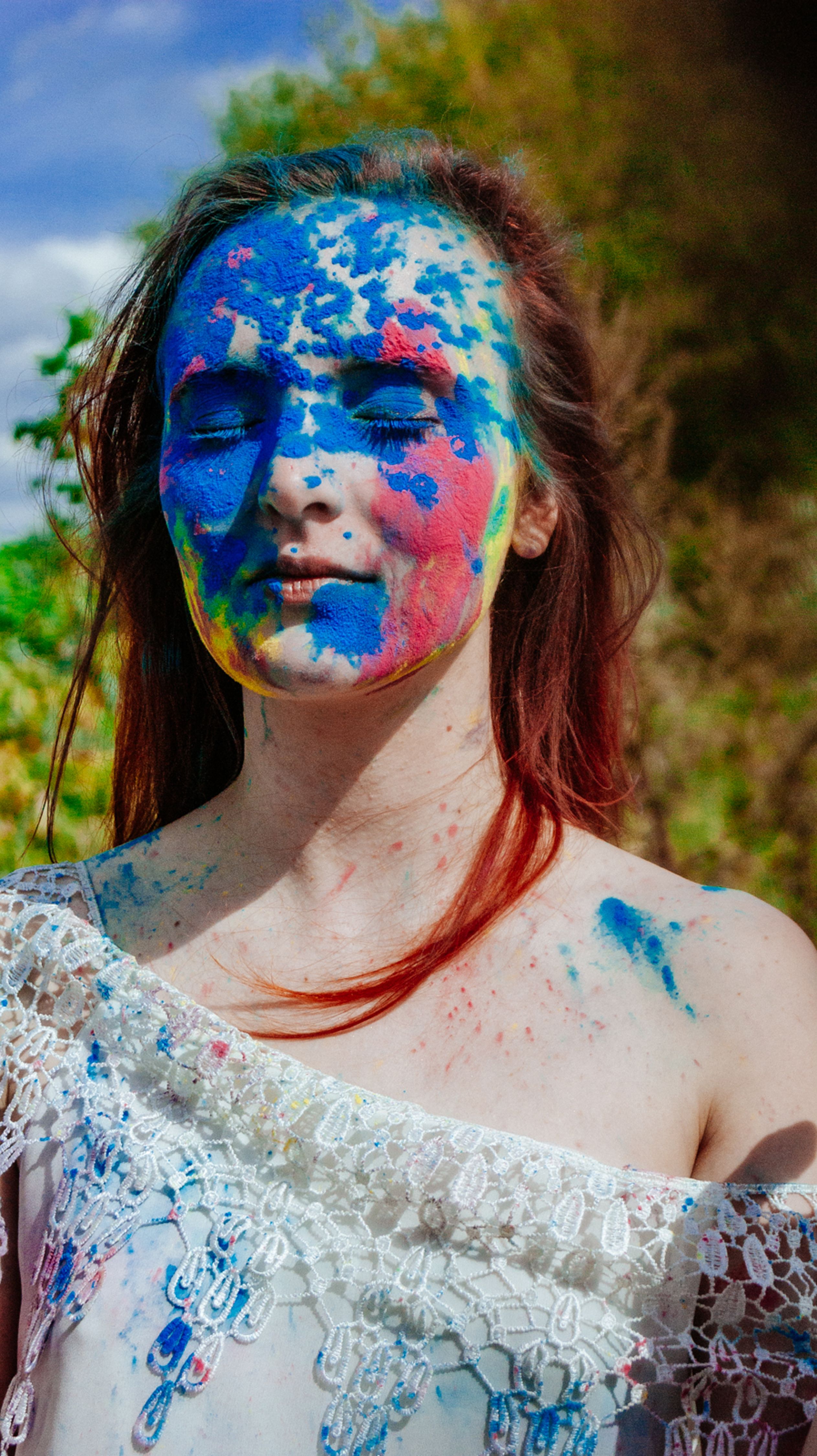 Woman with Painted Face · Free Stock Photo