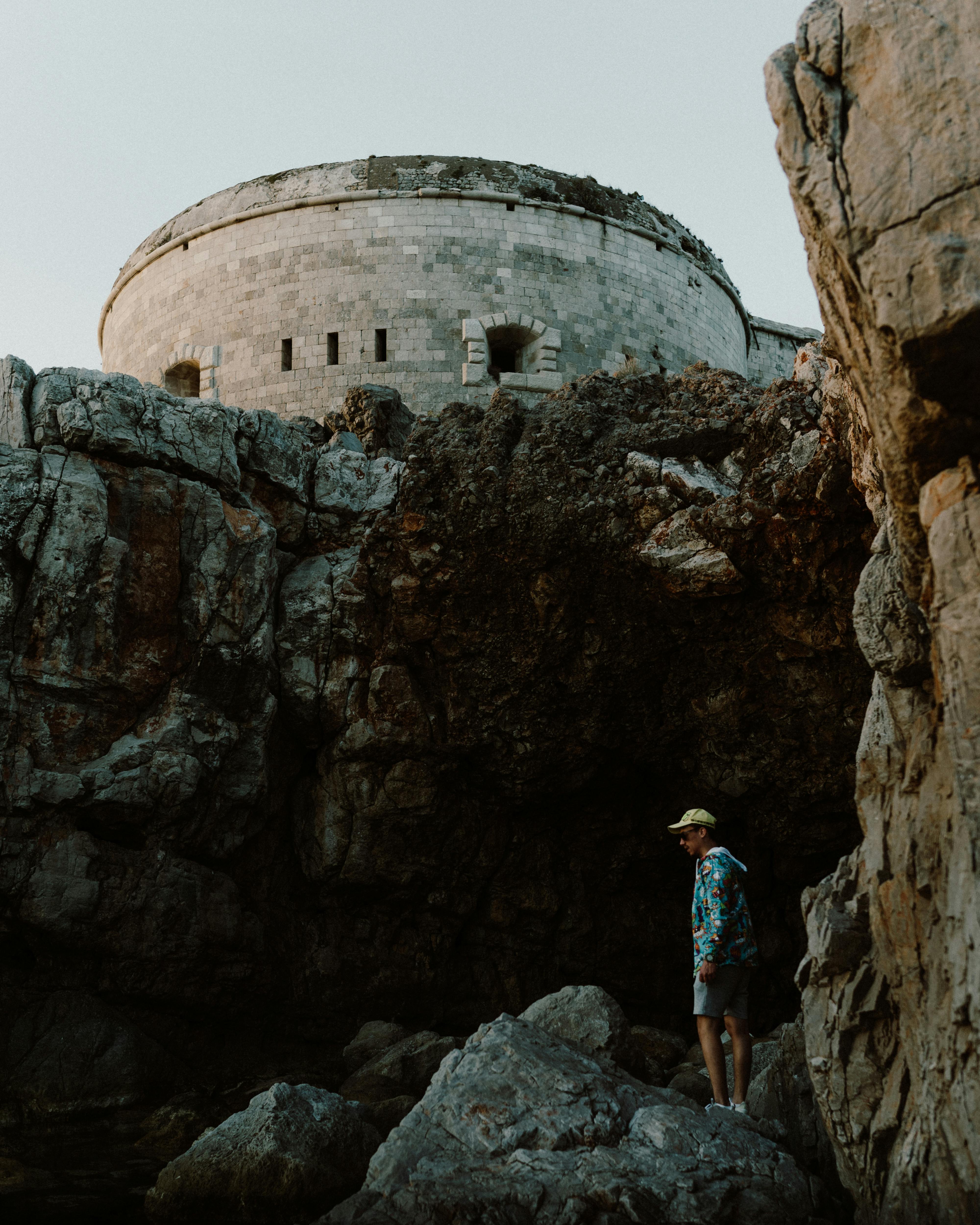 Woman Standing at Cliff Edge and Looking at Mountain Valley · Free ...