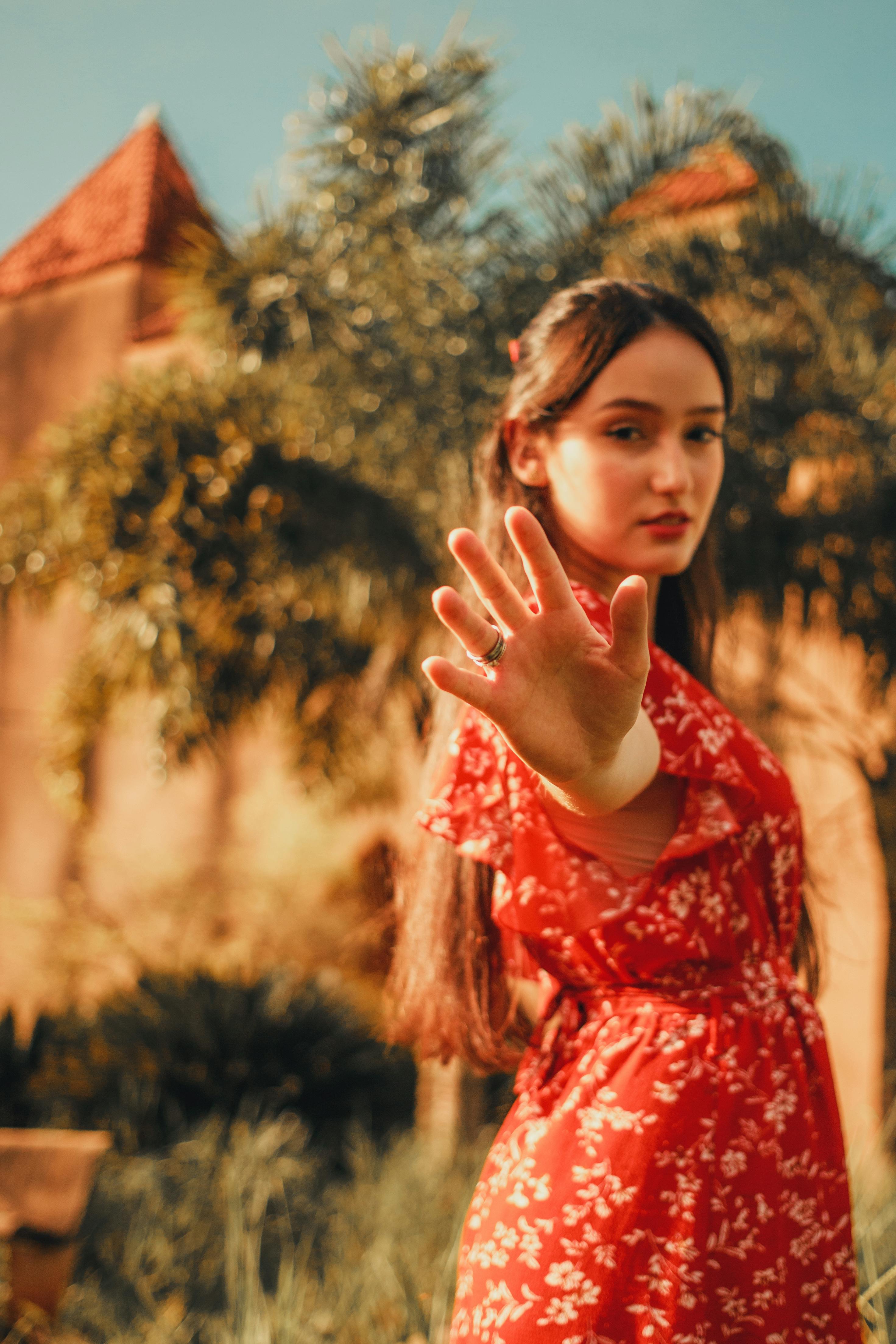 Woman Holding out her Hand · Free Stock Photo
