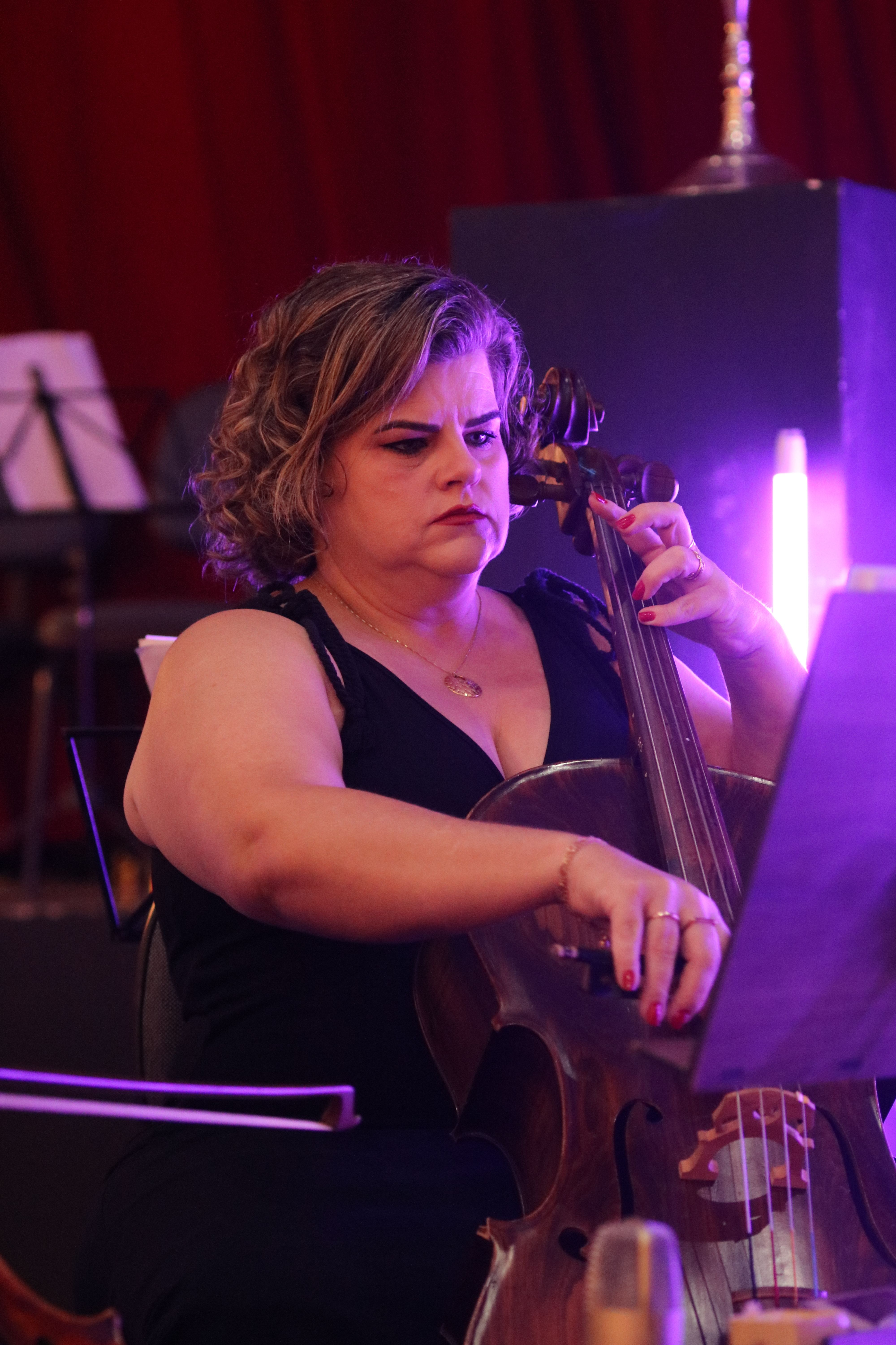 Woman in Red Dress Playing Cello · Free Stock Photo